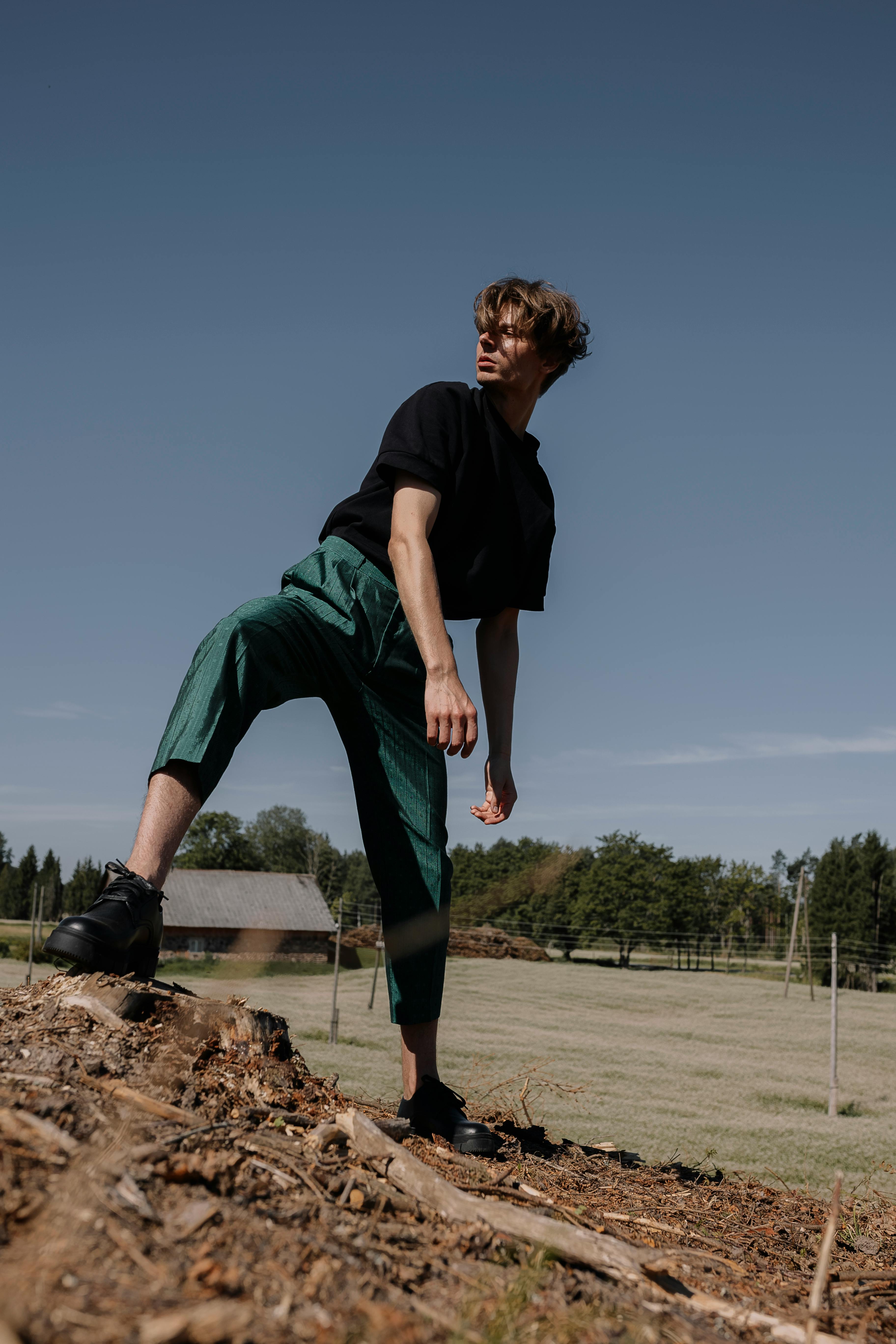 Young Man Posing Outdoors · Free Stock Photo