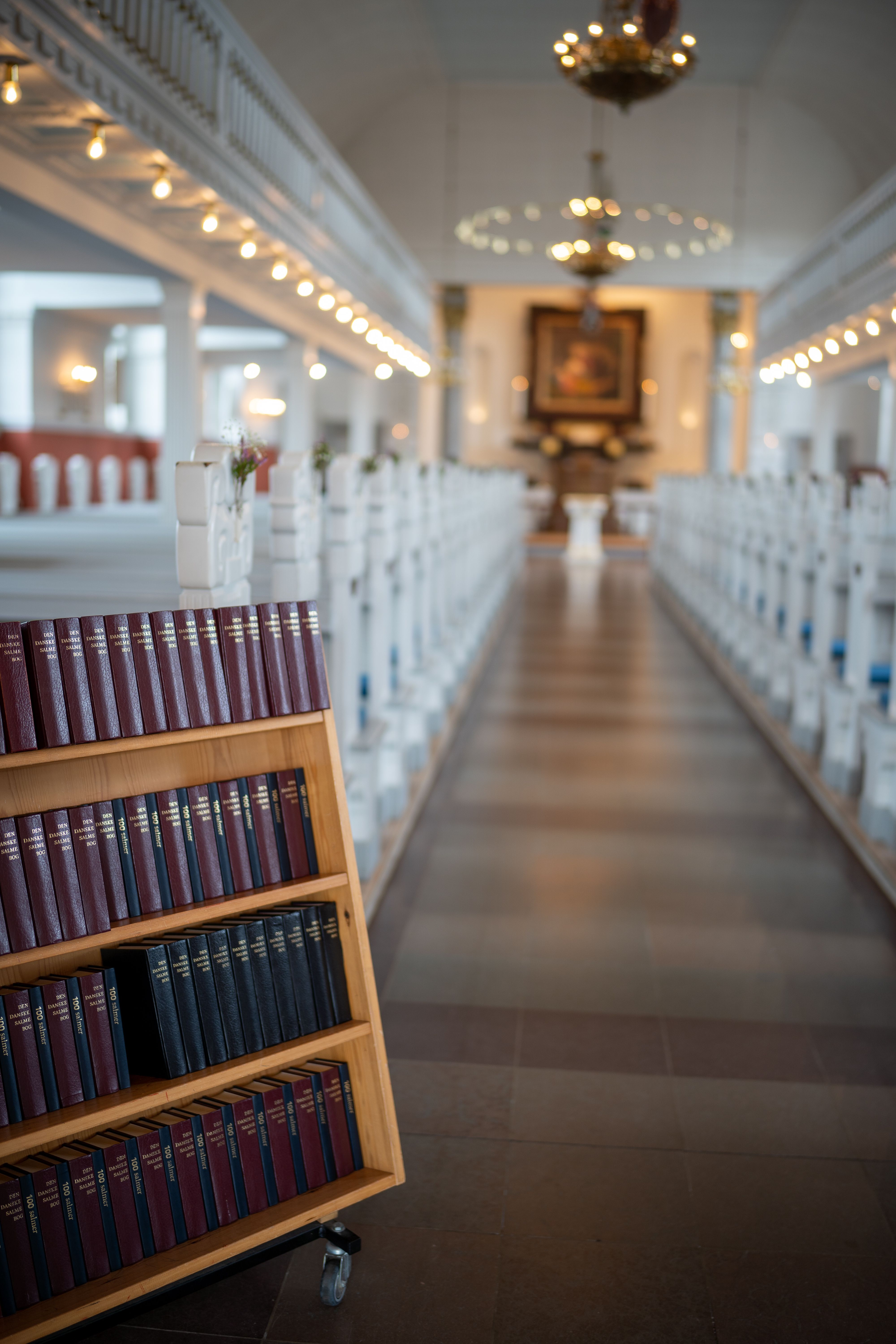 Display of Prayer Books in Church · Free Stock Photo