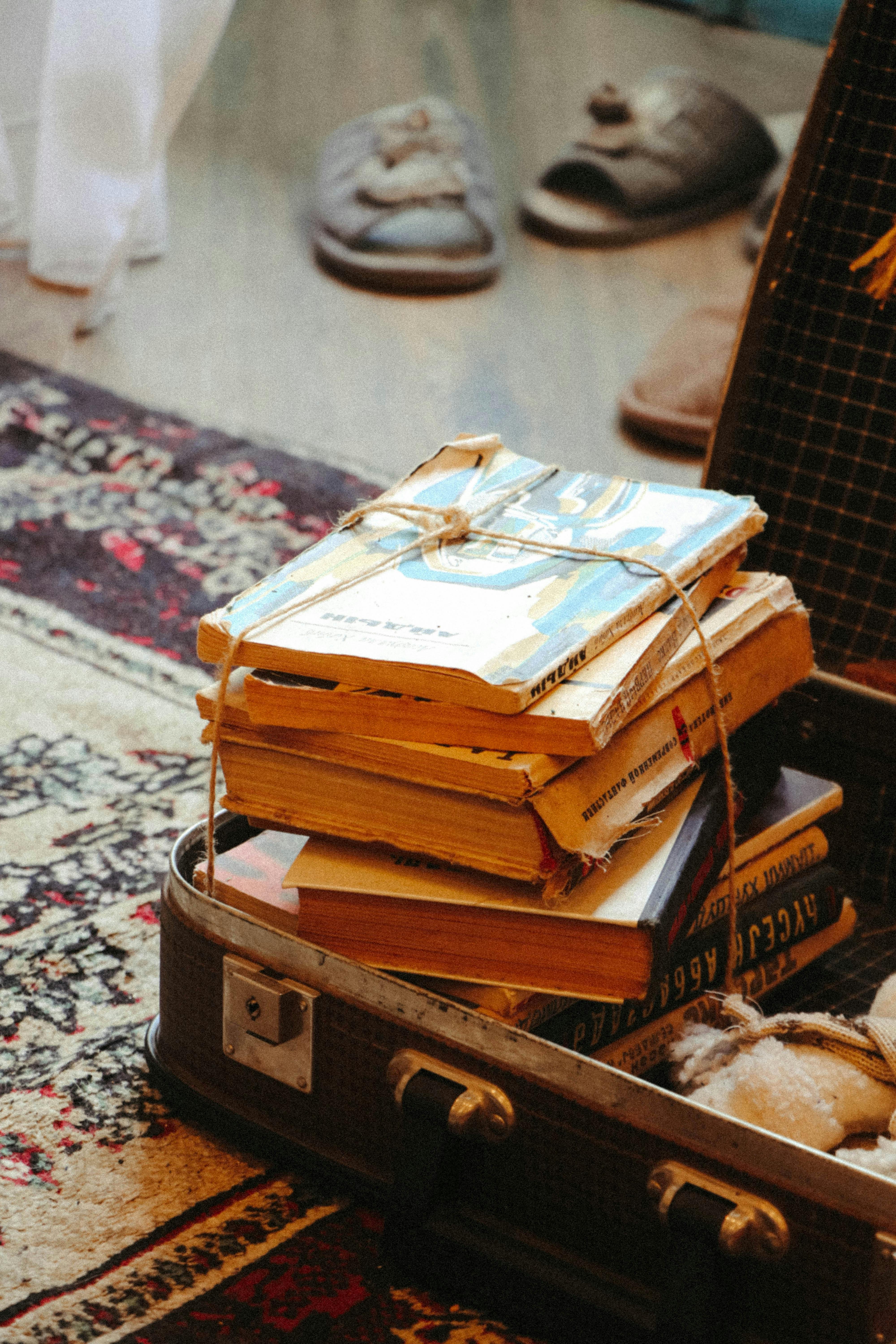 A Stack of Books Tied Together · Free Stock Photo