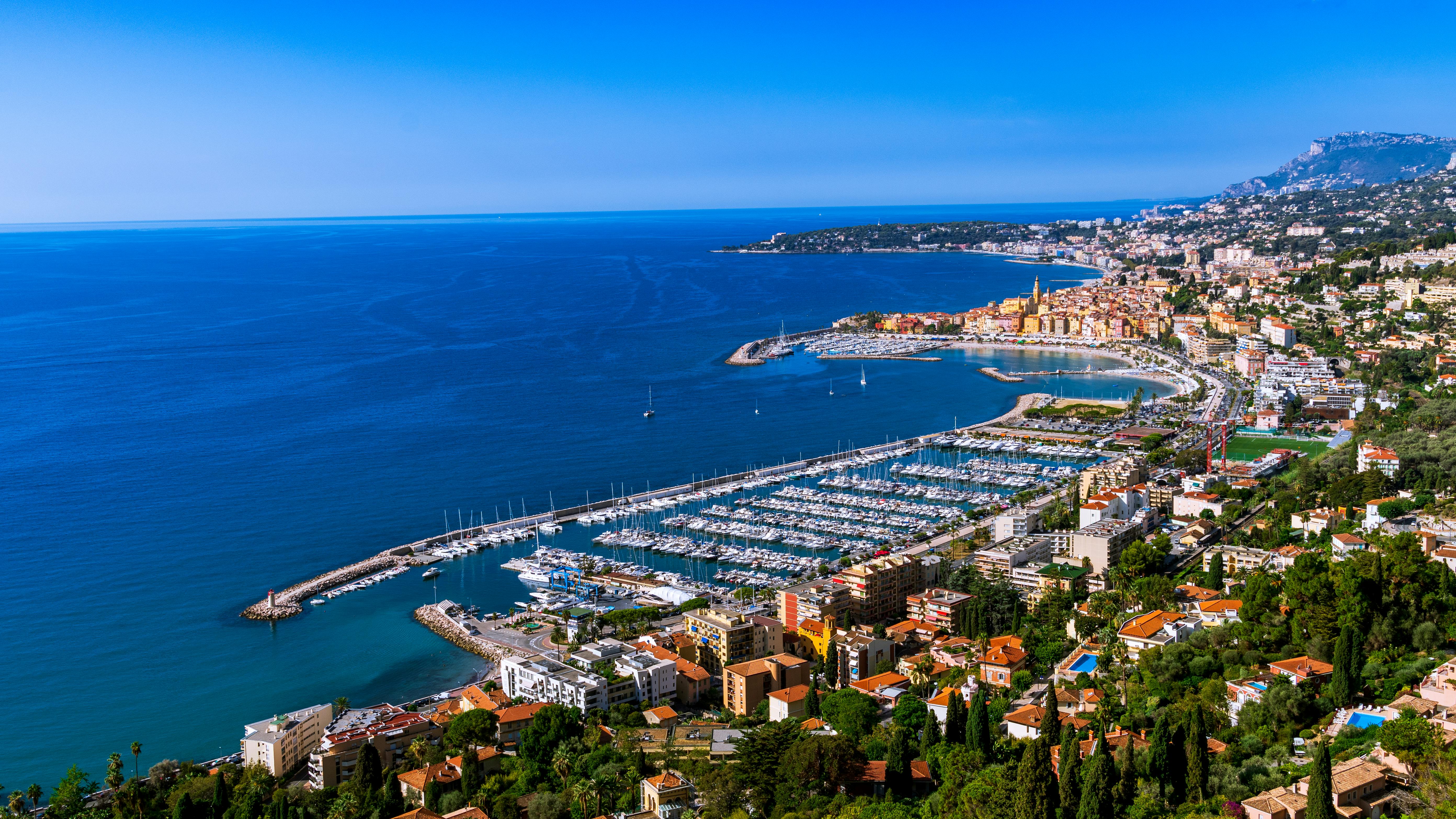 Aerial View of Harbor and City Buildings Near Body of Water · Free ...