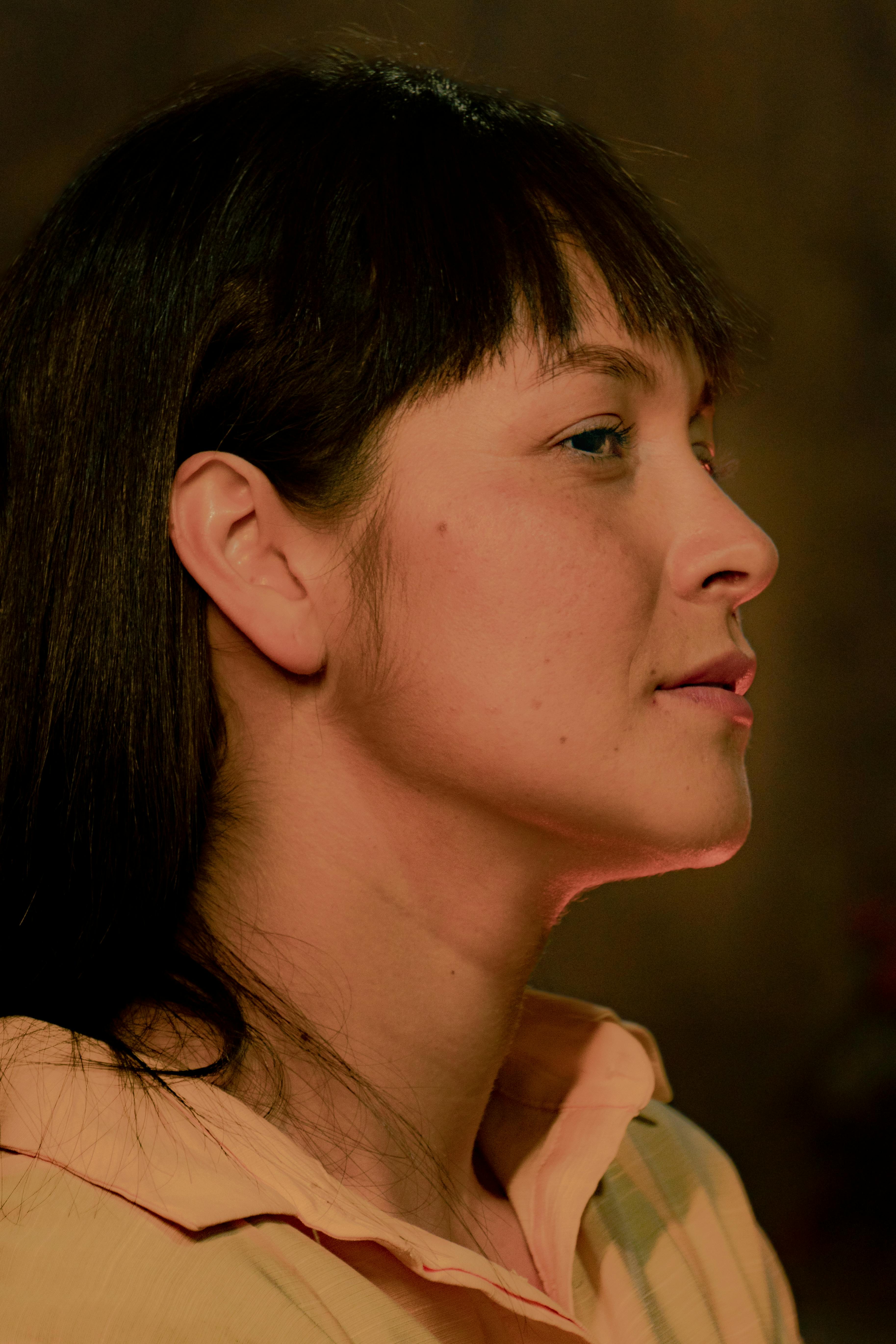 Woman Facing Sideways · Free Stock Photo