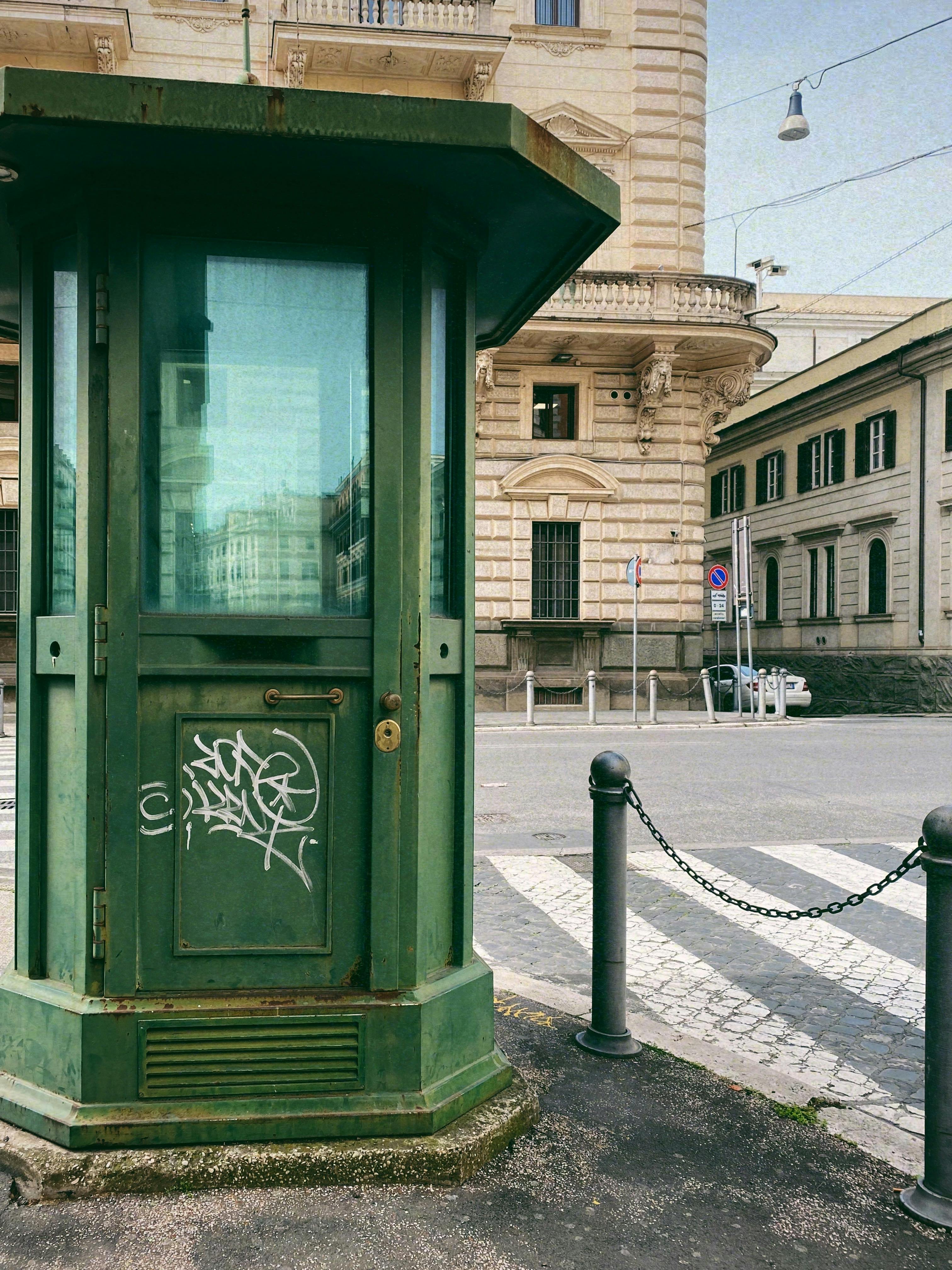 Green Booth on the Street · Free Stock Photo