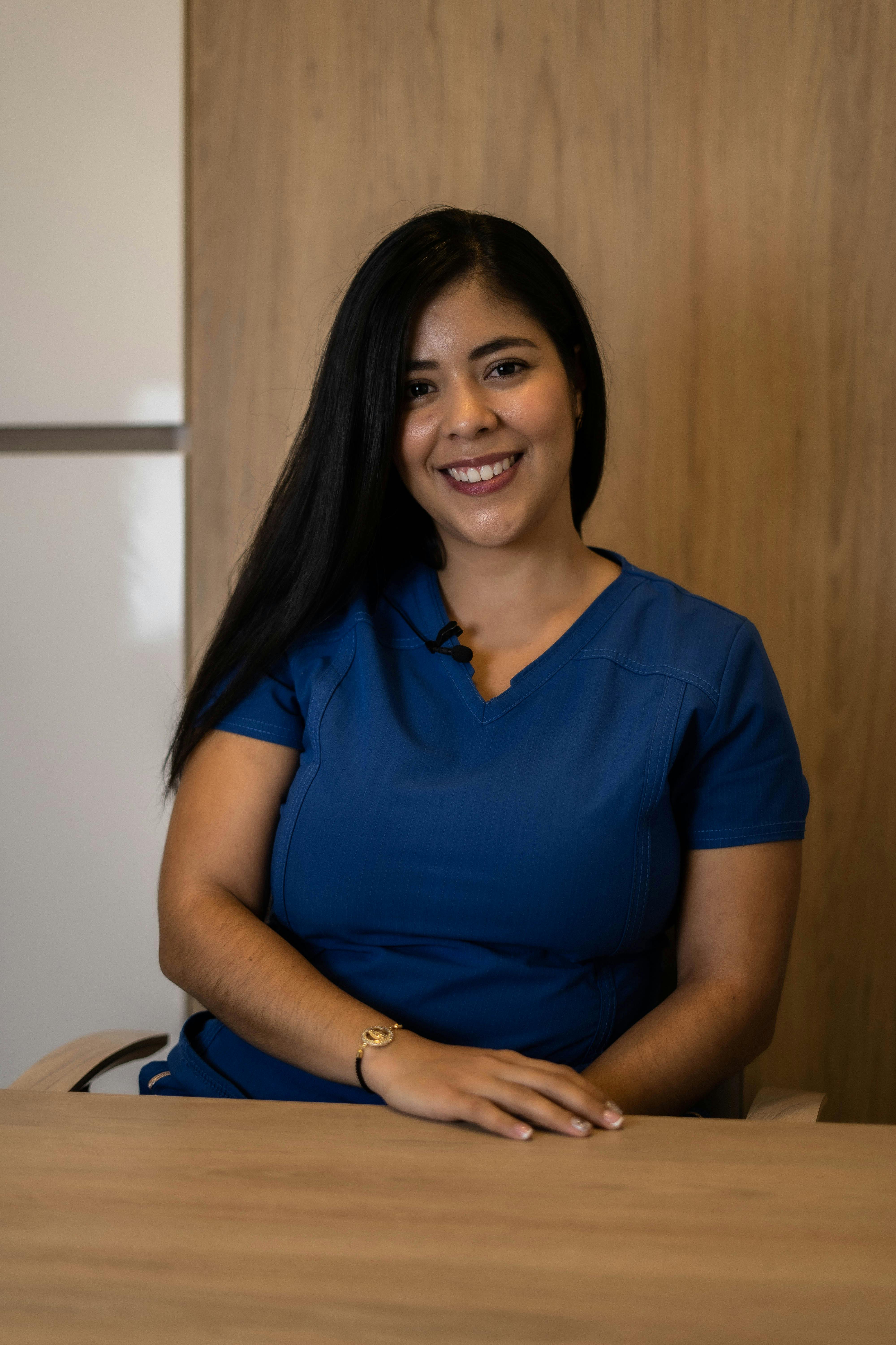 Woman Wearing a Blue Top · Free Stock Photo