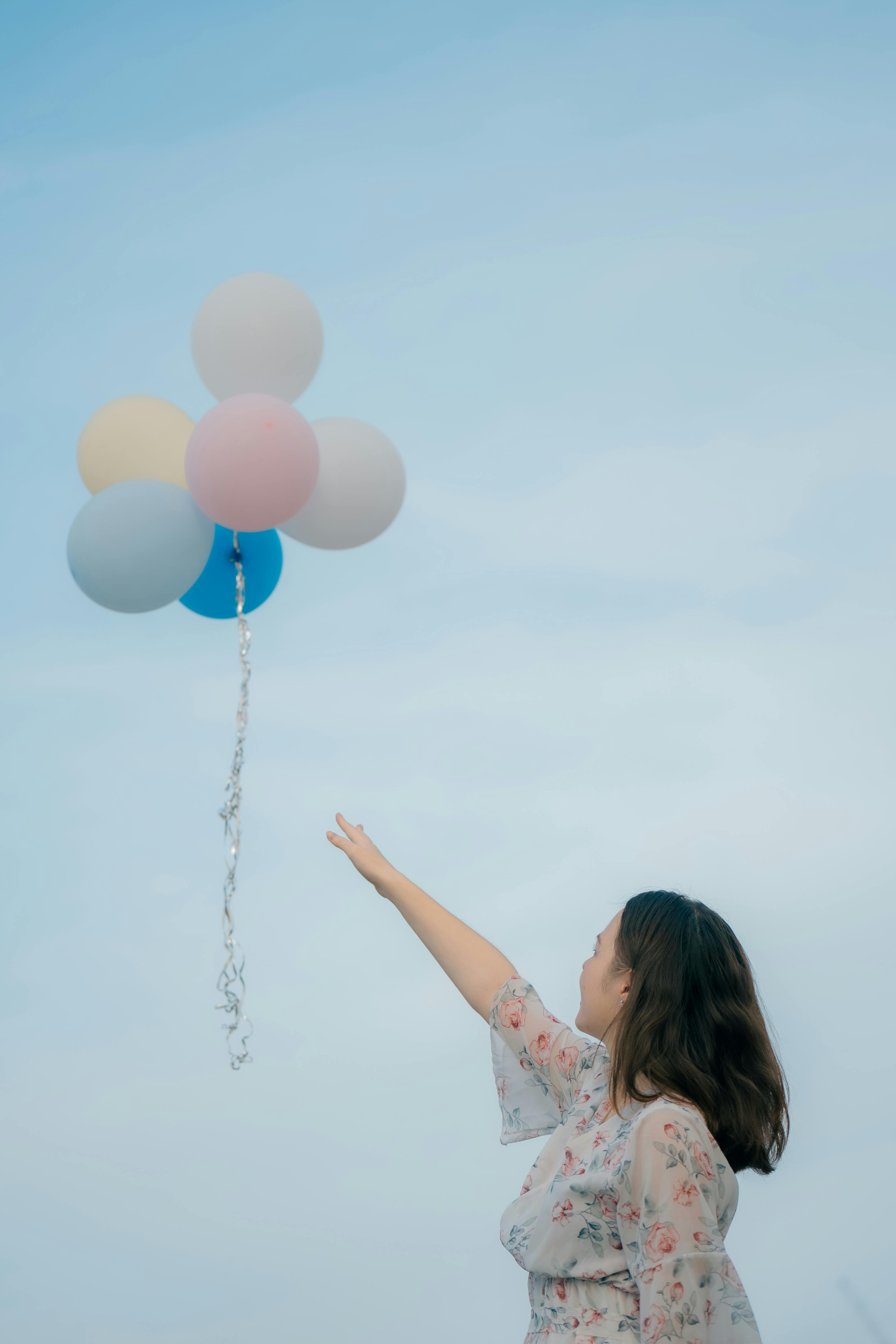 Silhouette of a Person Raising His Hand · Free Stock Photo