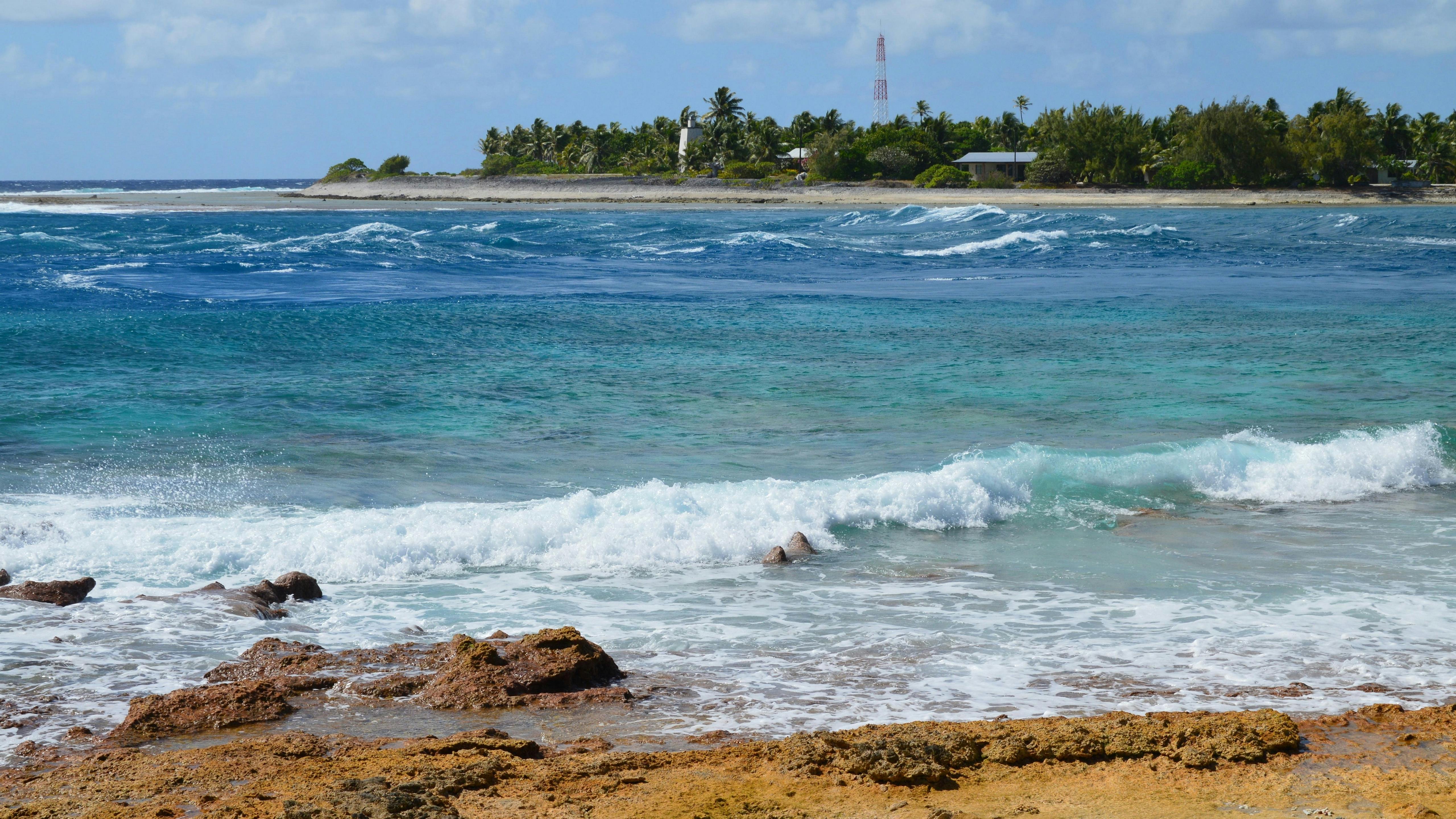 Overcast over Sea Shore with Beach and Road · Free Stock Photo