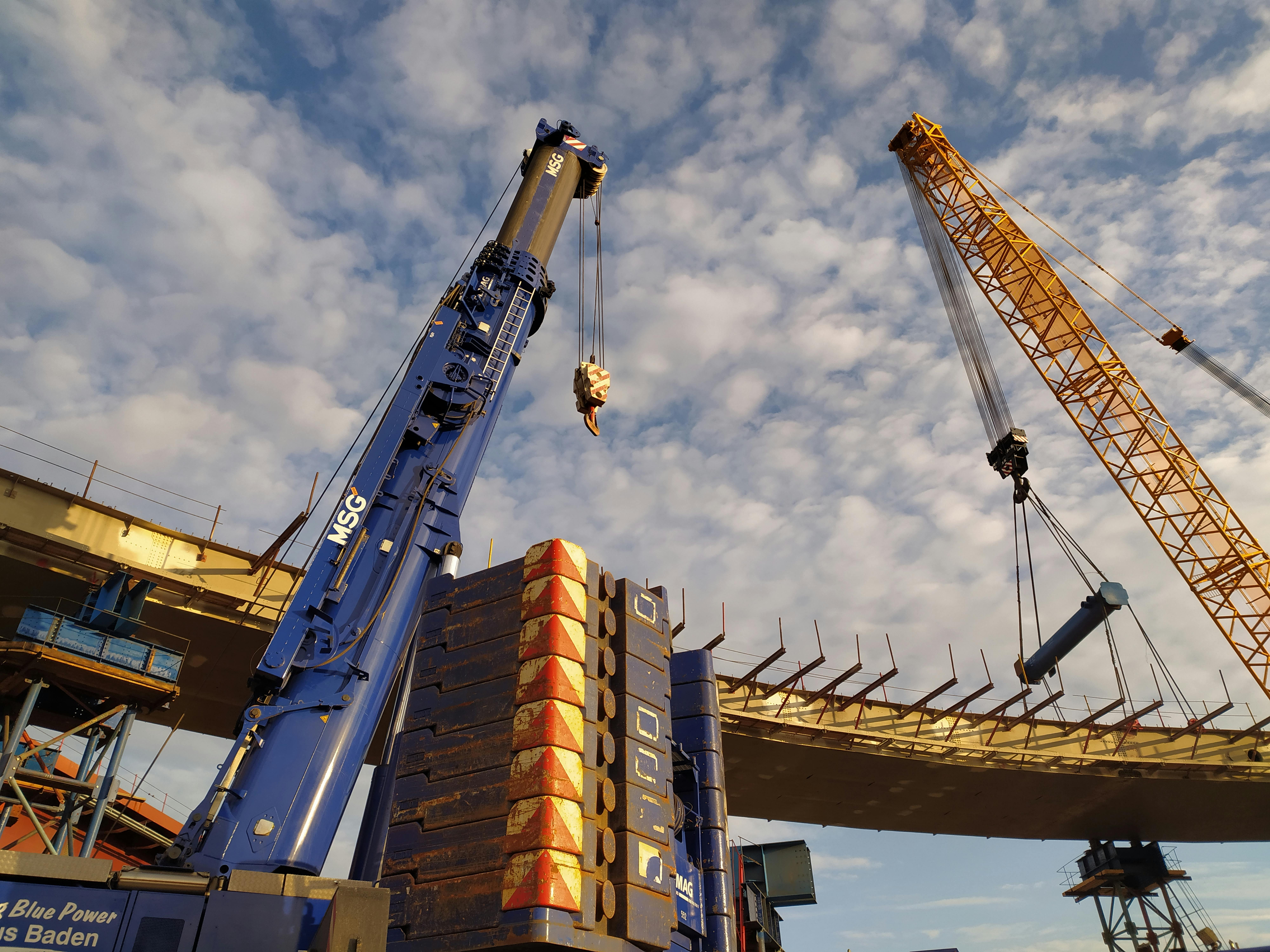 Industrial Cranes at a Construction Site · Free Stock Photo