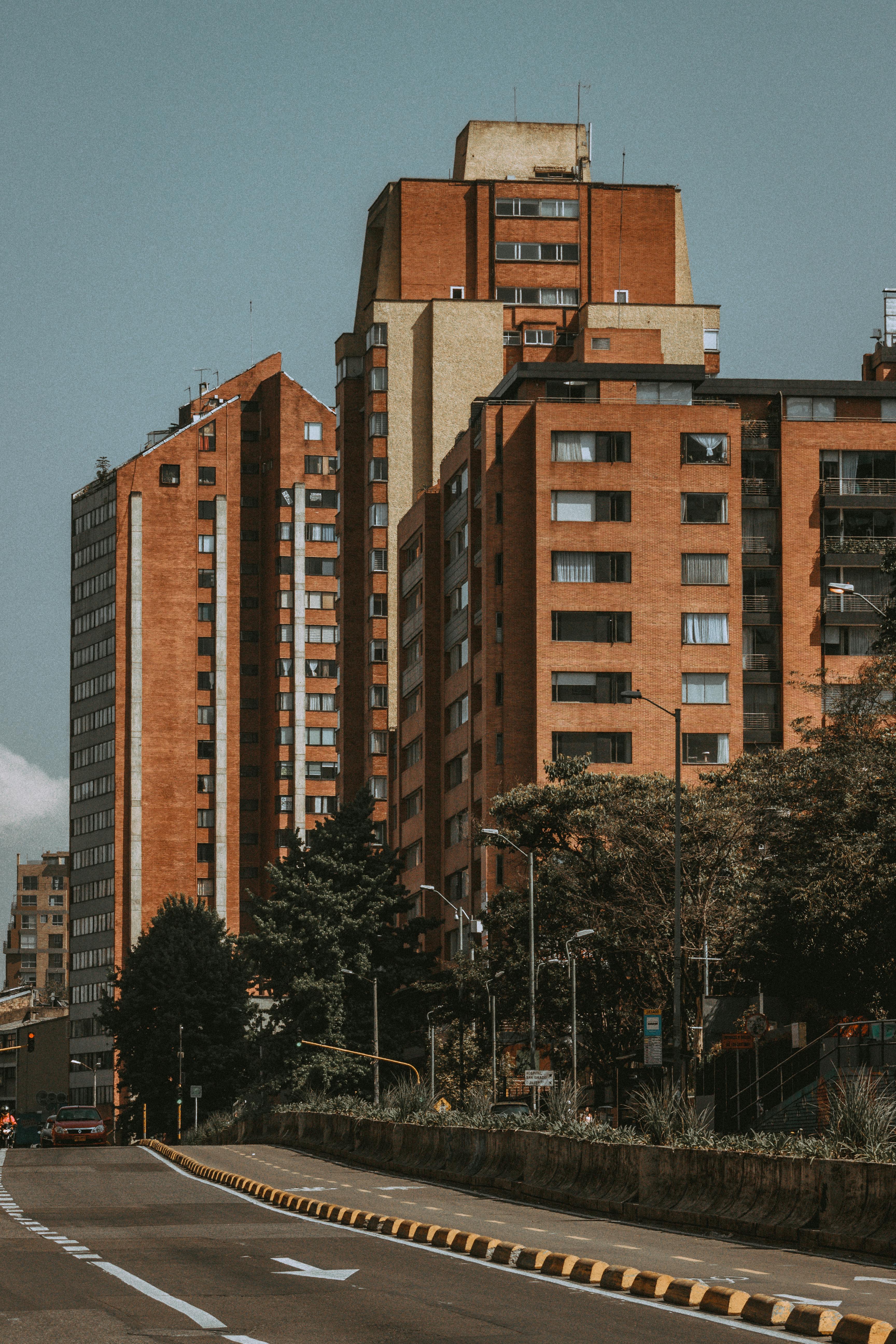 Sky Peeking Through Opening Between Buildings · Free Stock Photo
