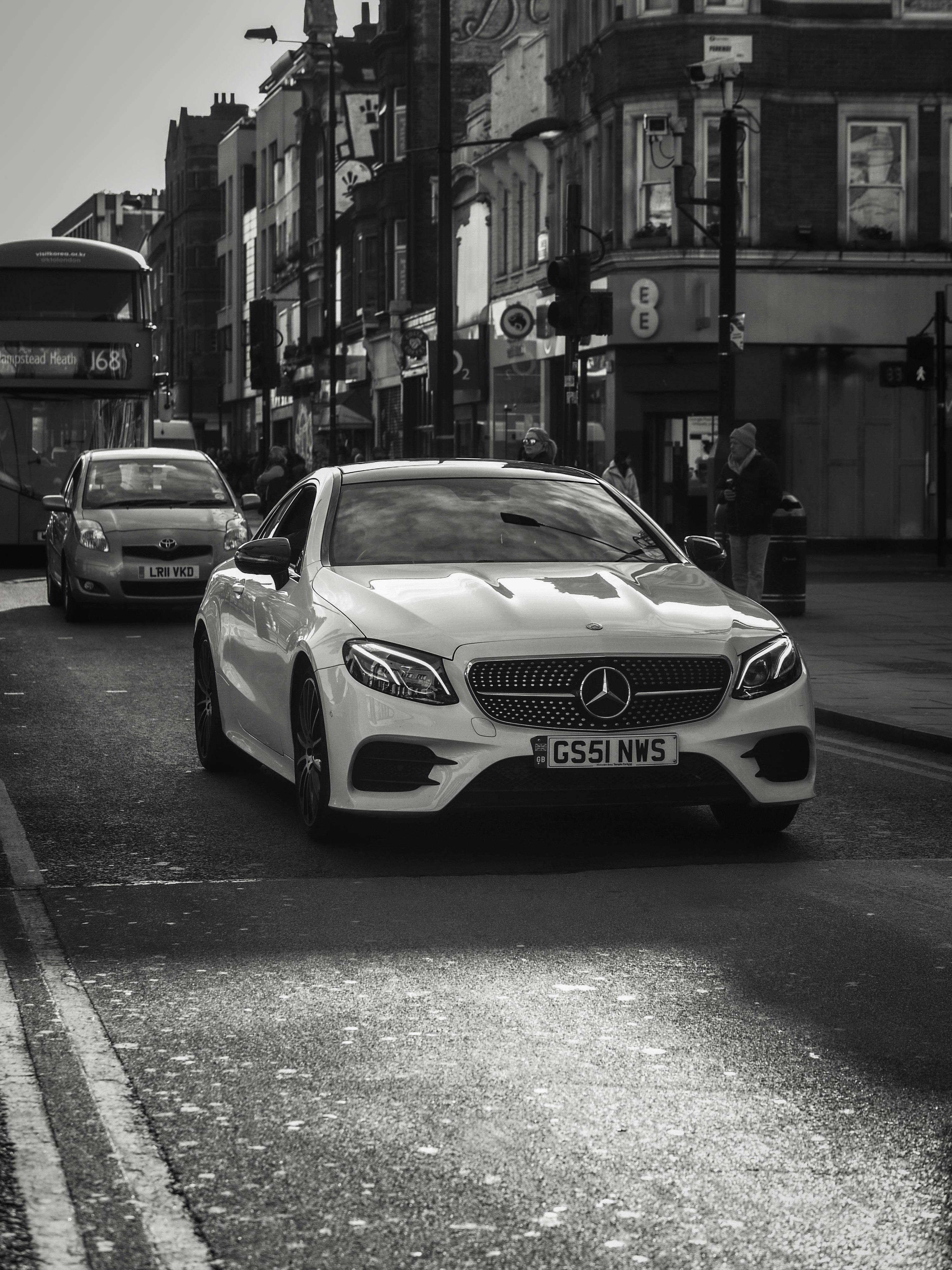 White Mercedes Benz on the Road · Free Stock Photo