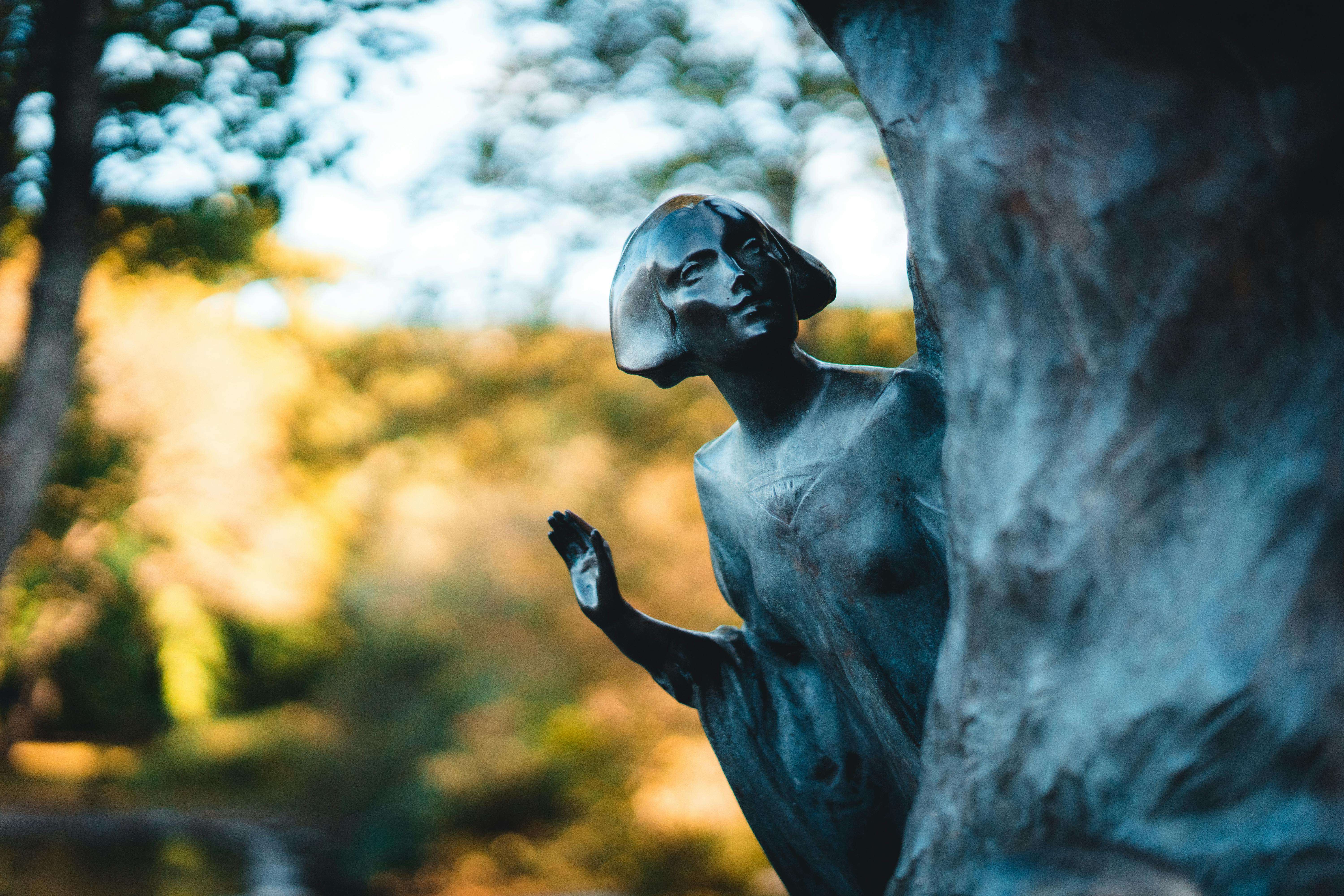 Close Up Photo of a Black Statue · Free Stock Photo