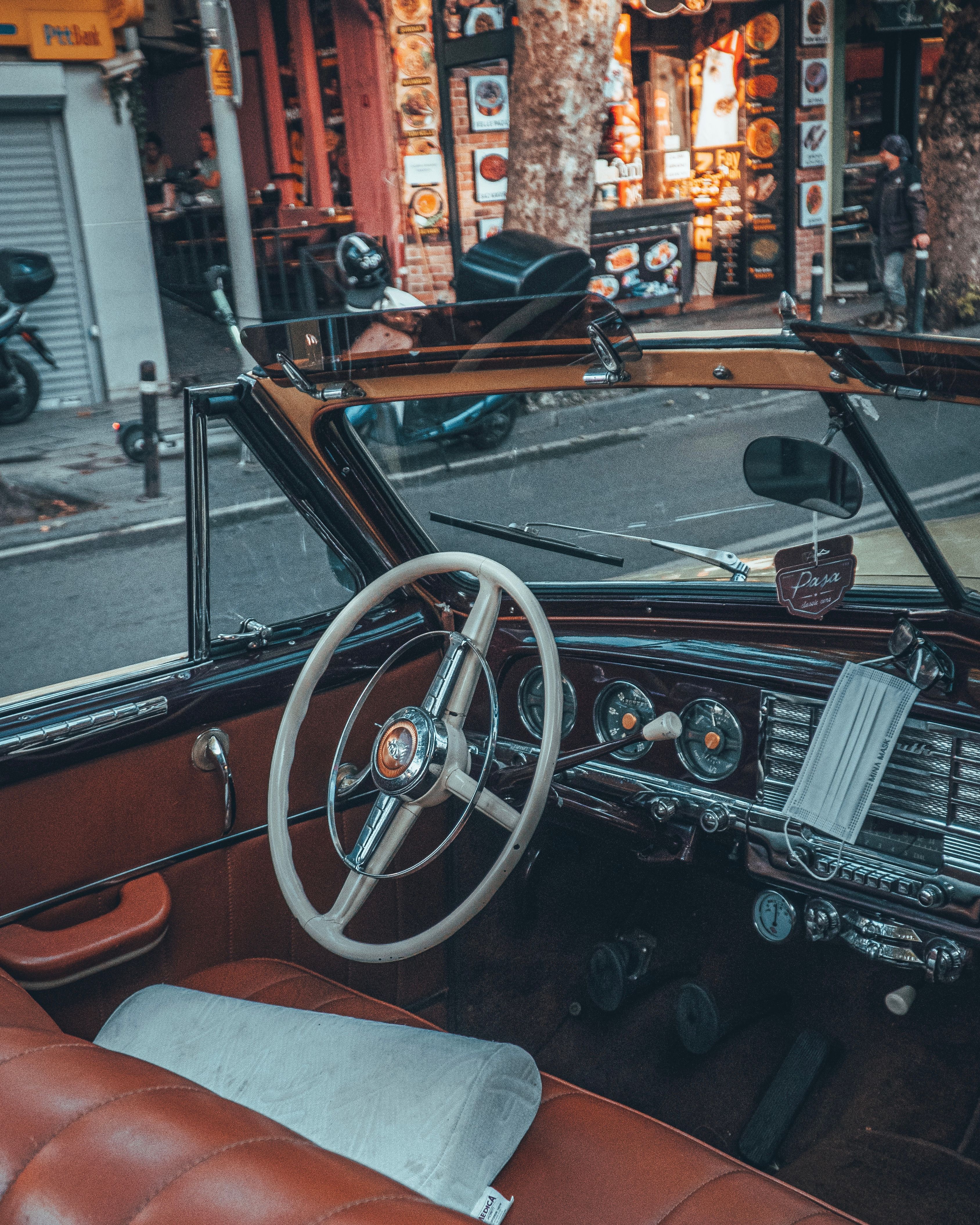 White and Silver Steering Wheel of the Car · Free Stock Photo