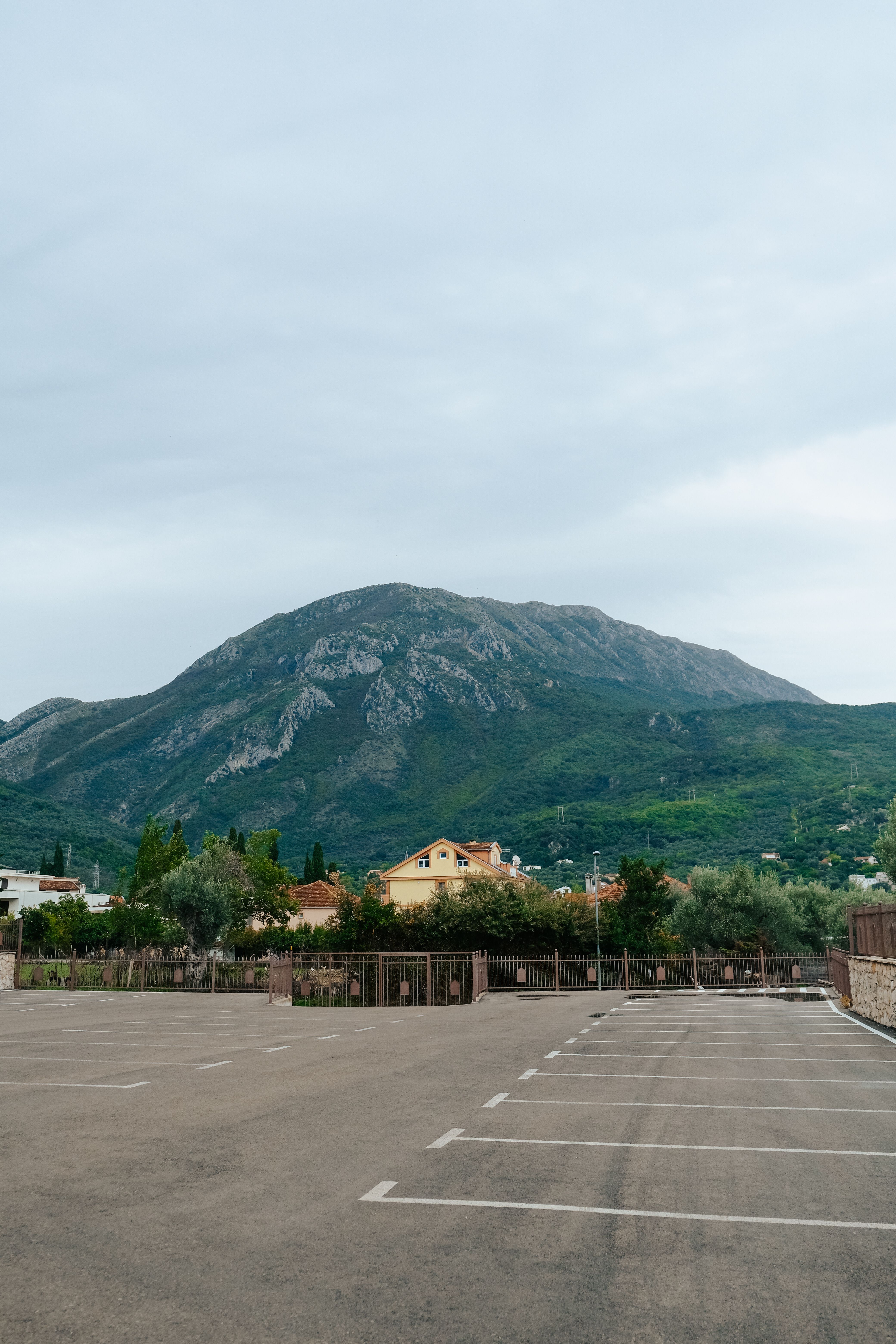Parking Lot Near A Mountain Free Stock Photo