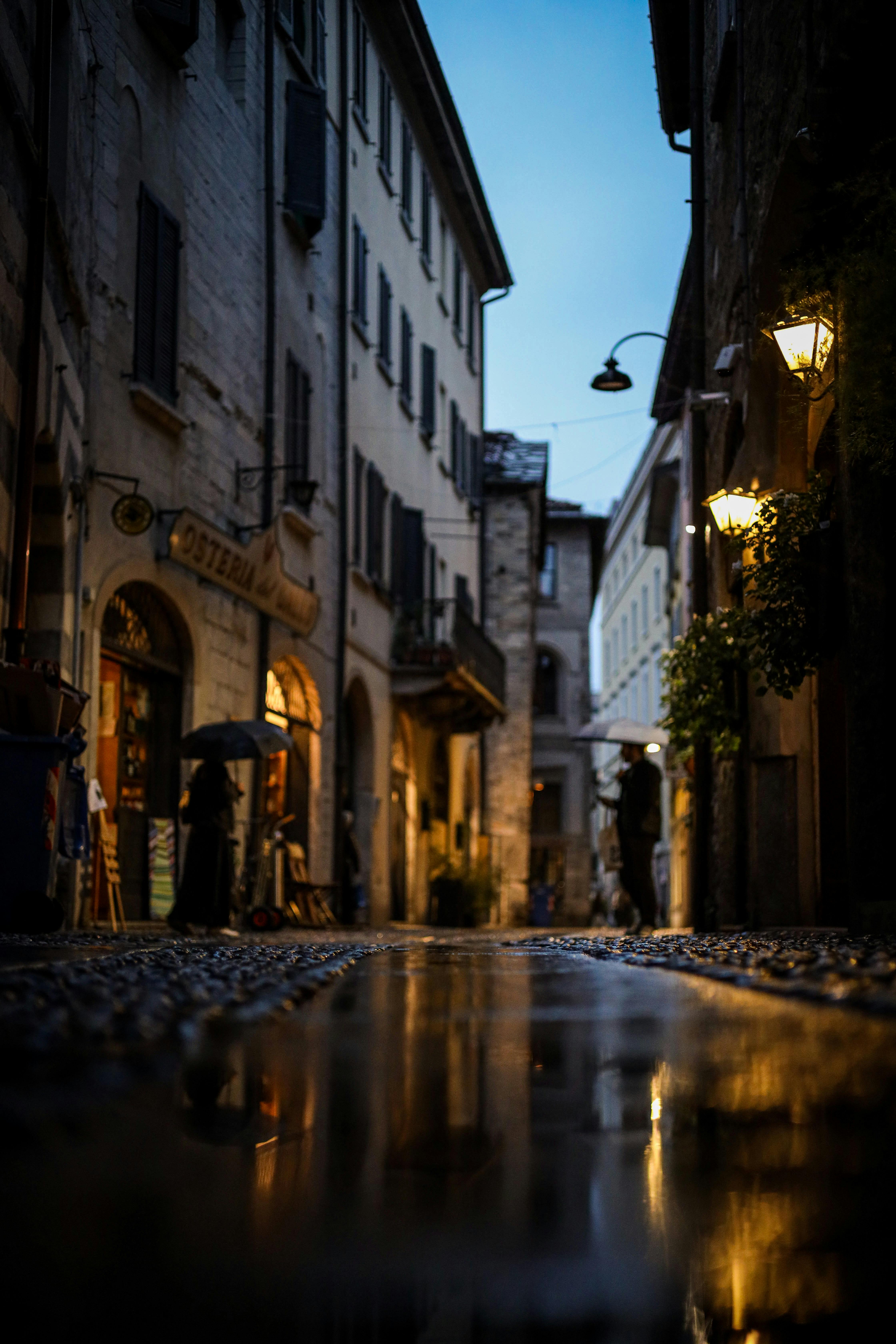 Narrow Alley with Traditional Buildings on a Rainy Evening · Free Stock ...