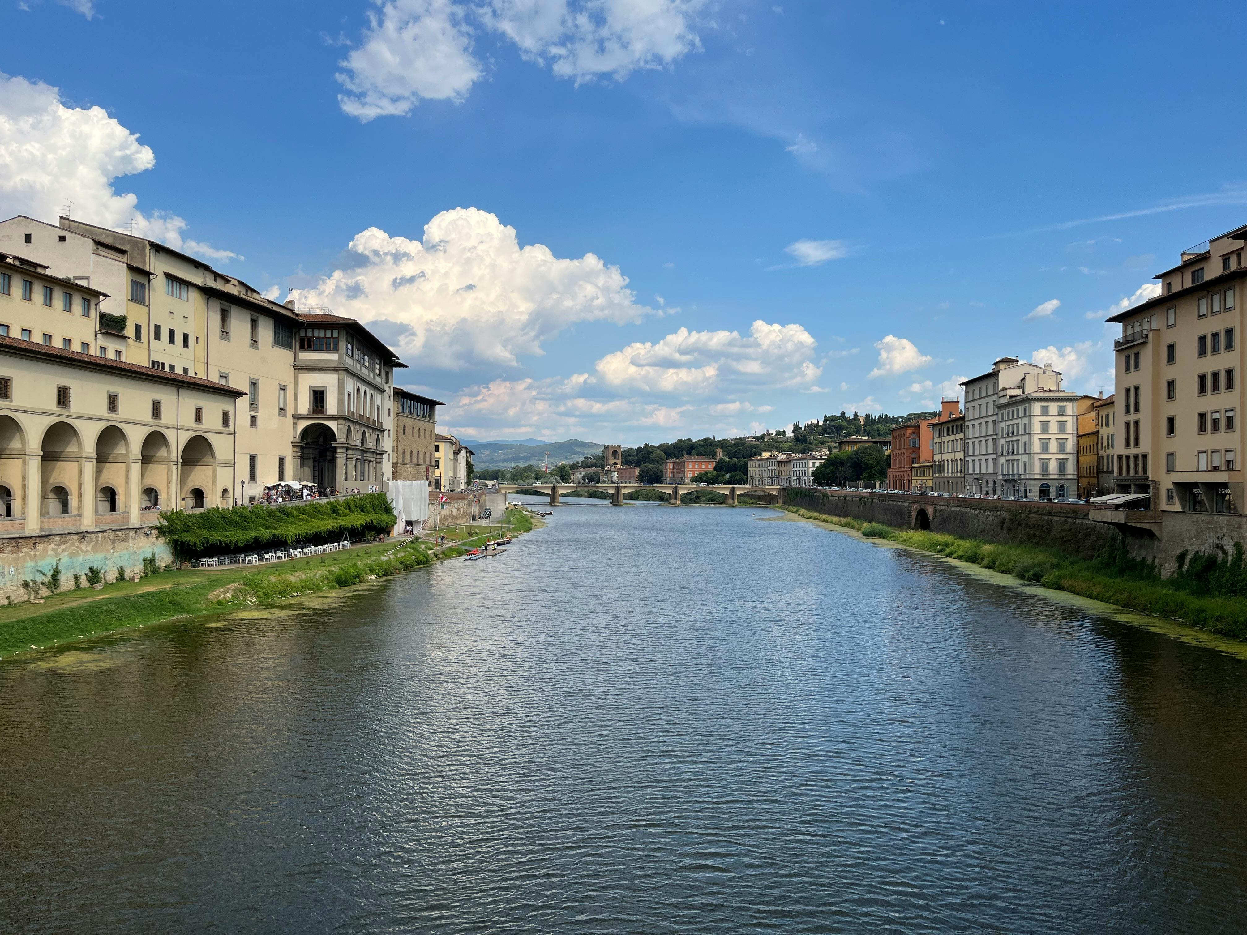 A River Between Buildings Under the Blue Sky and White Clouds · Free ...
