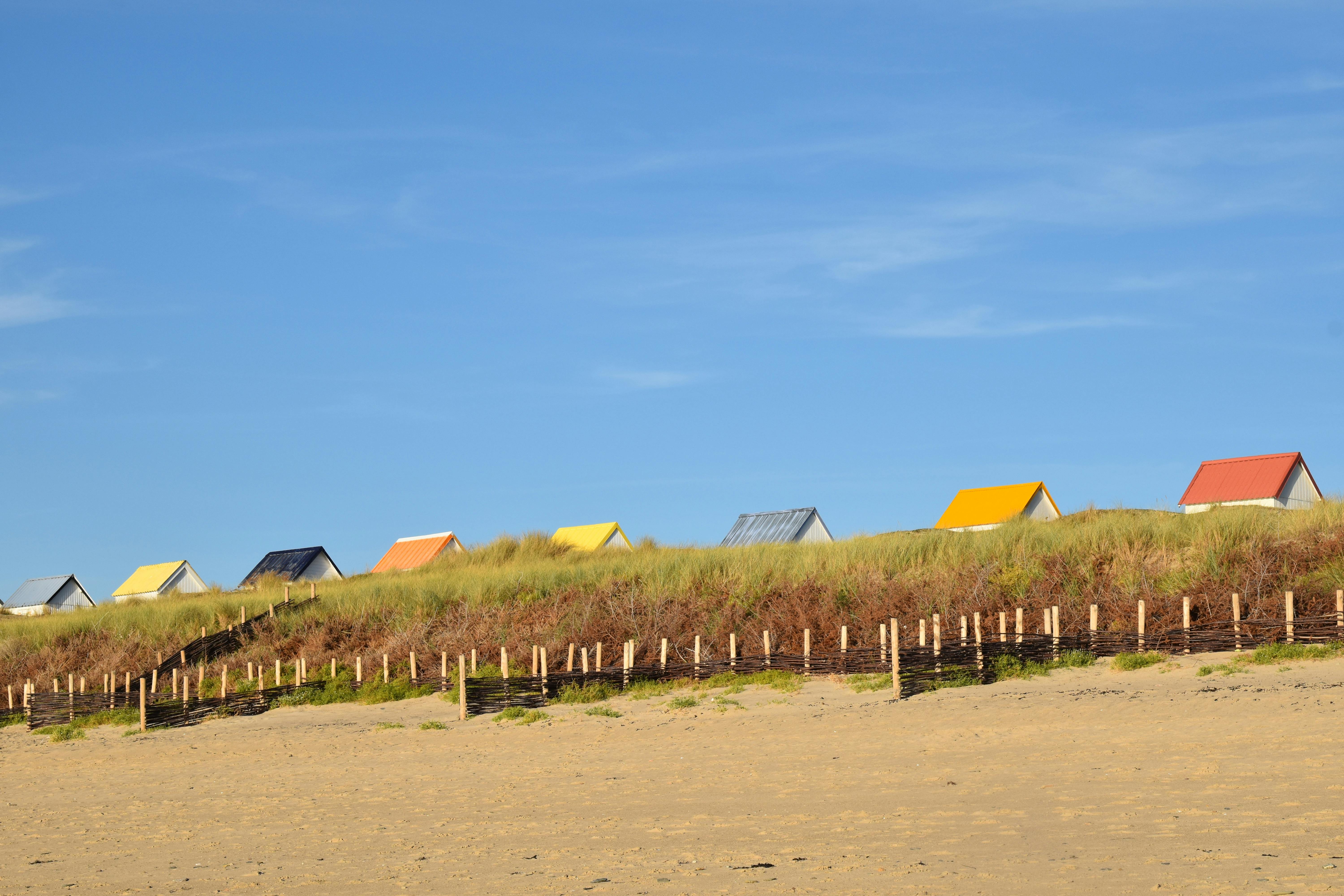 Beach and Houses with Colorful Rooftops · Free Stock Photo