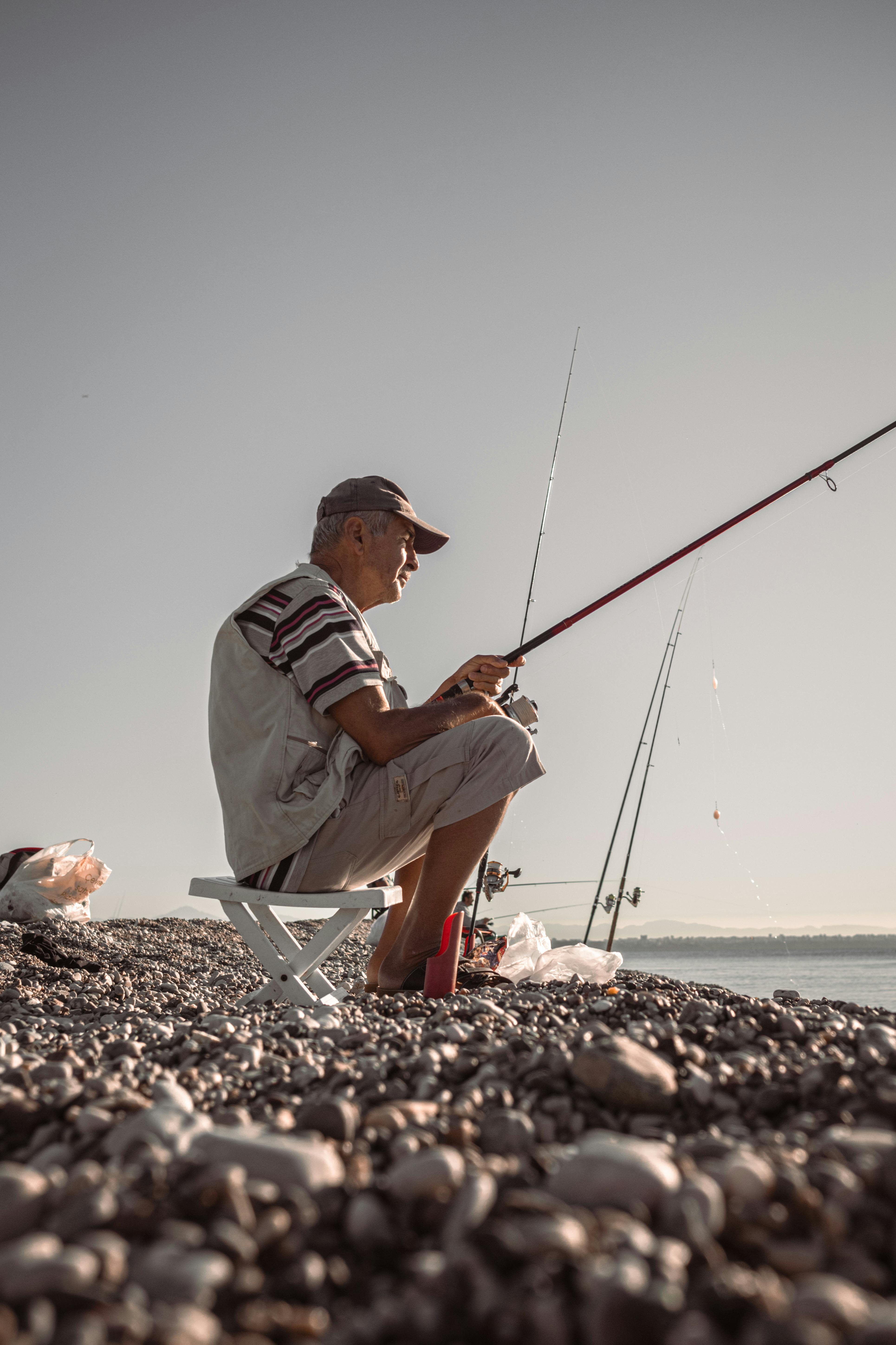 Man Catching a Fish · Free Stock Photo