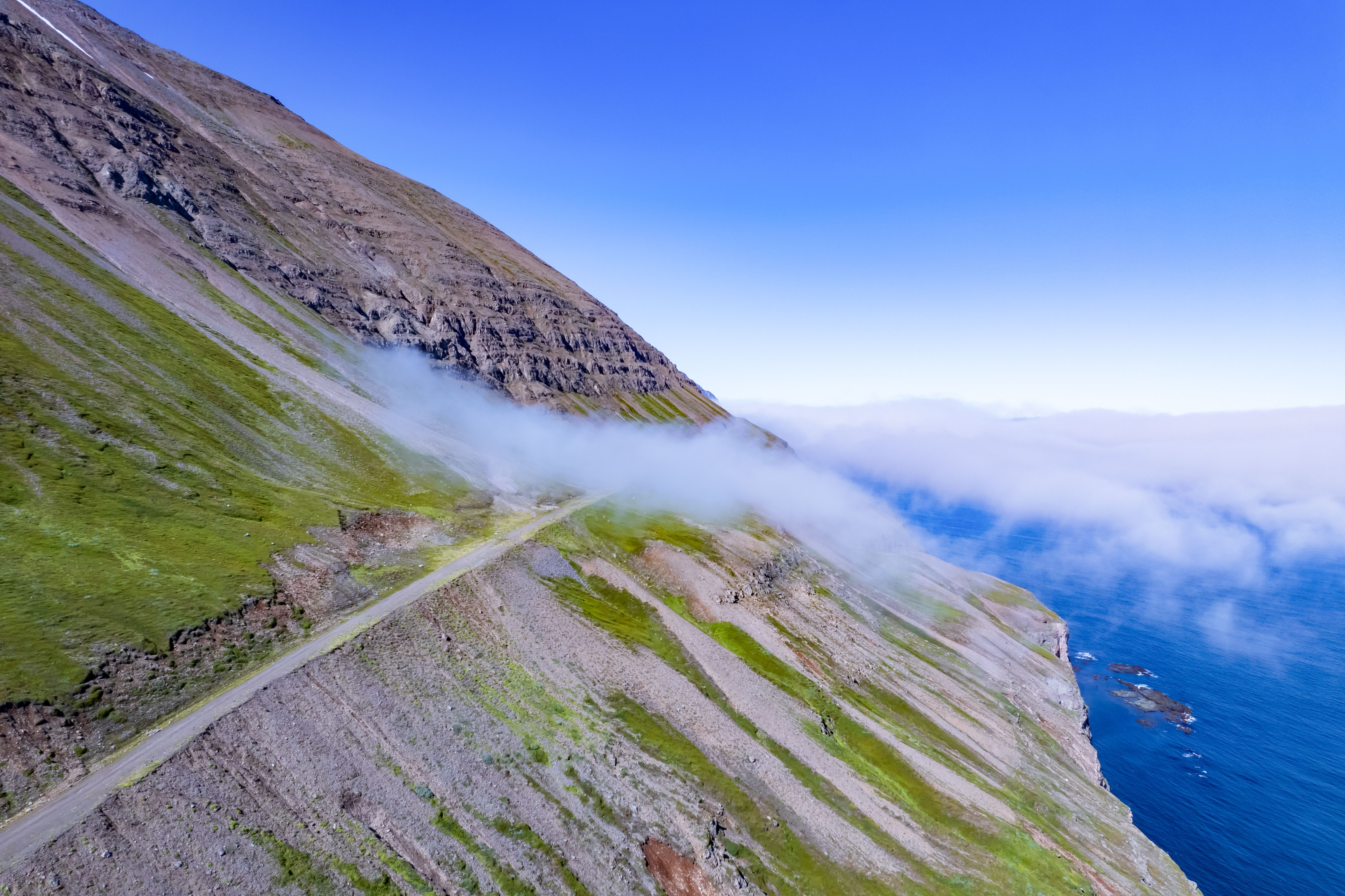 Road on Mountainside by Ocean · Free Stock Photo