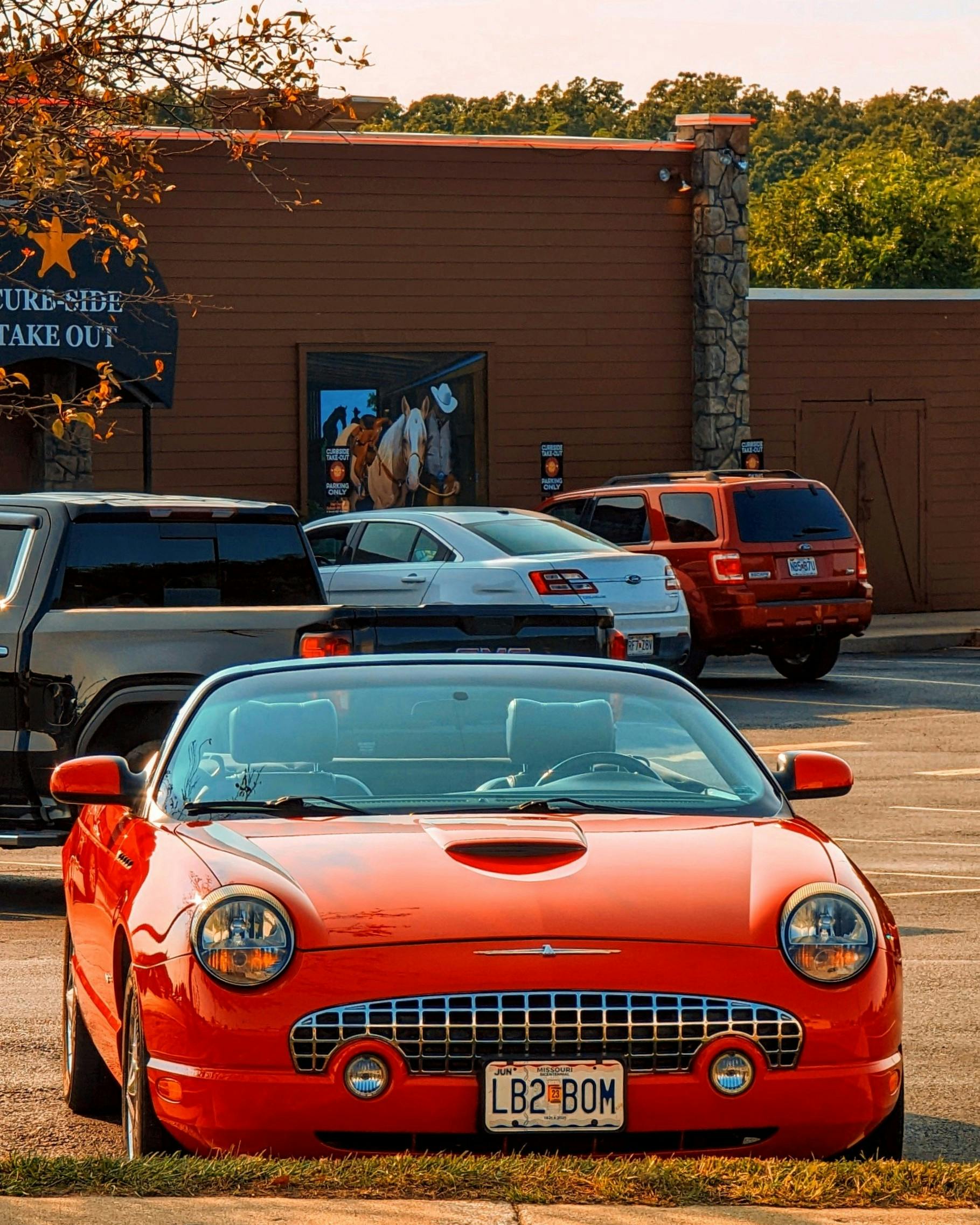 Red Convertible Car Parked on Parking Lot · Free Stock Photo