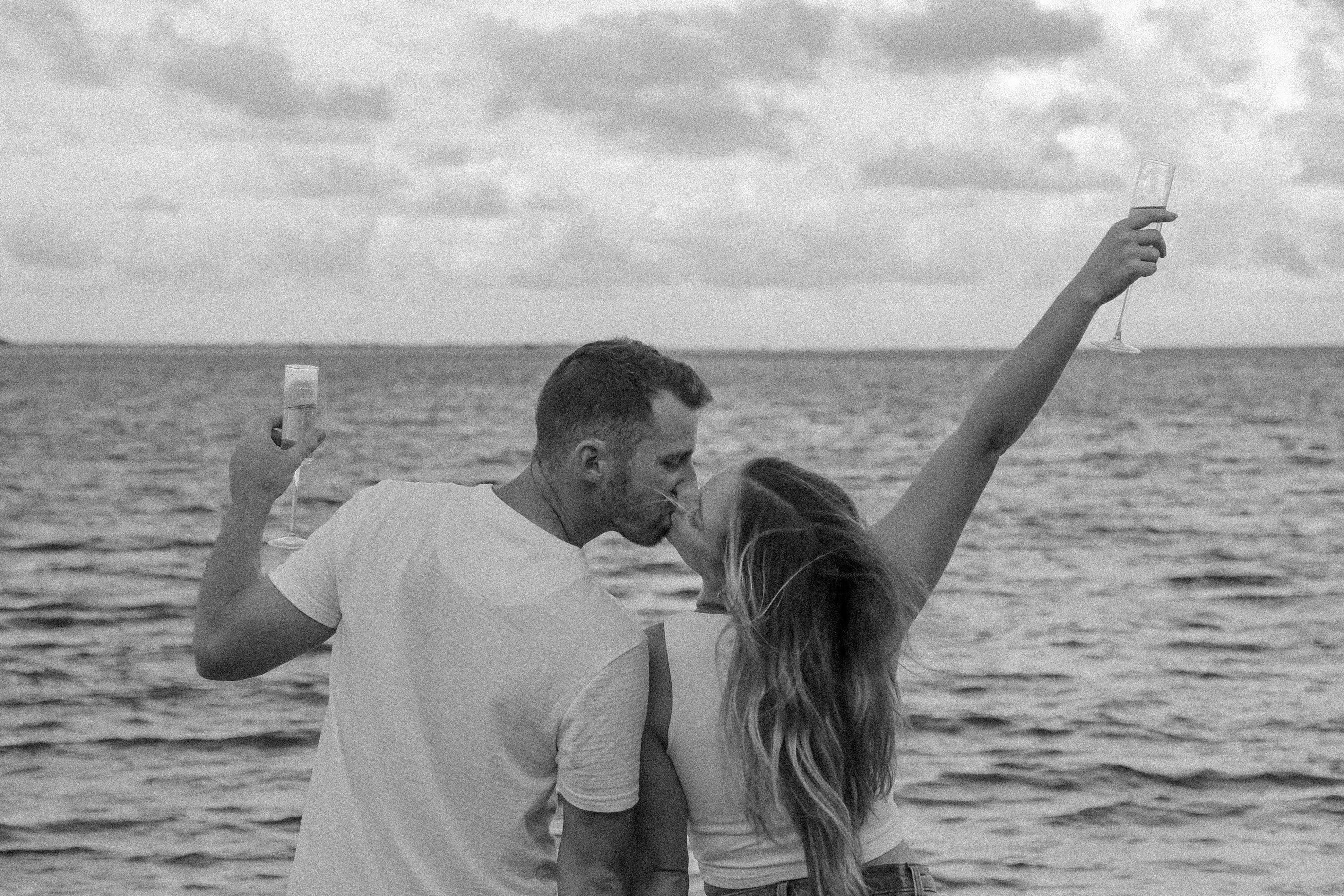 Monochrome Photo of Couple In Ocean · Free Stock Photo