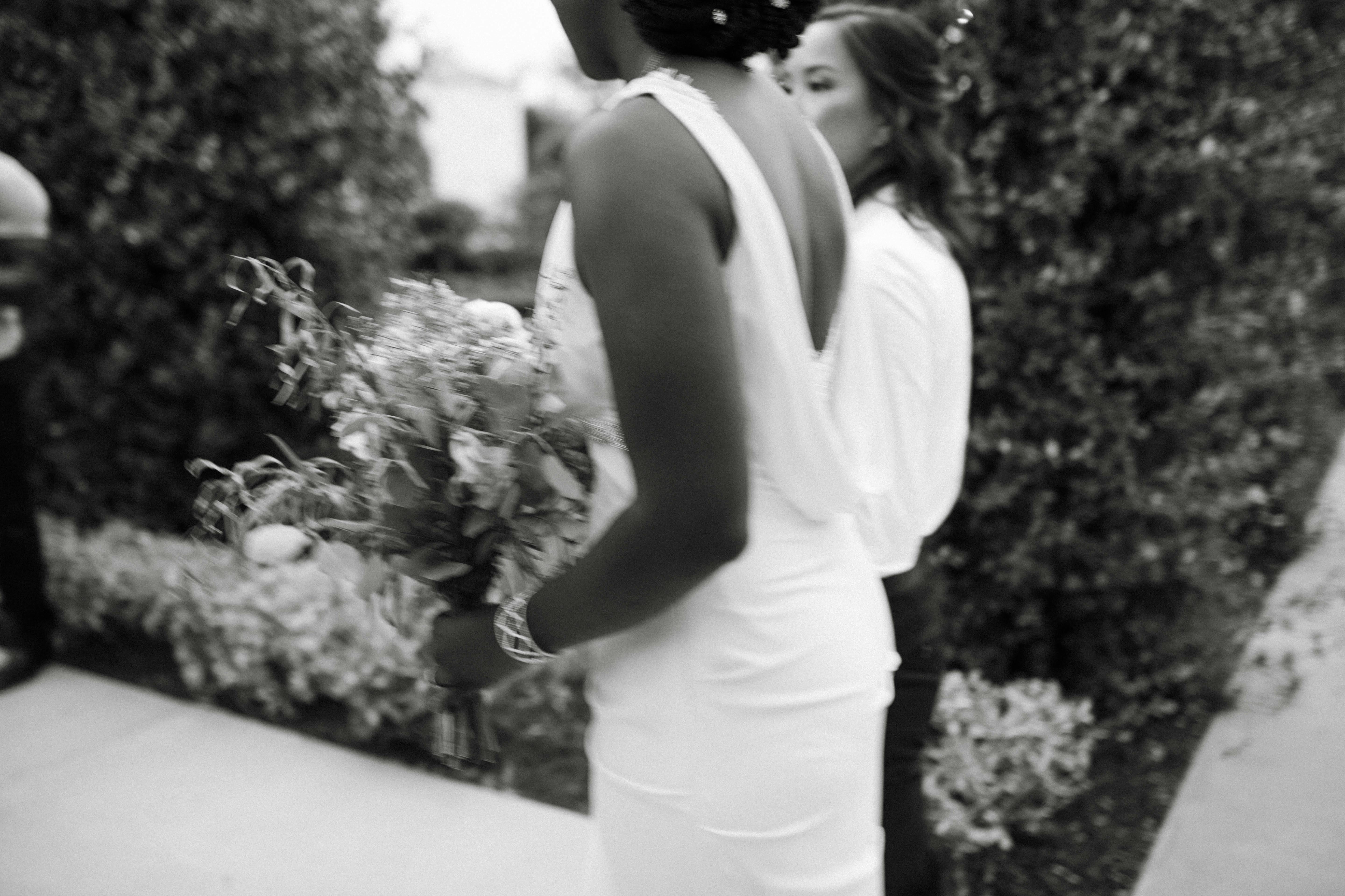 Bride Putting on White Heels · Free Stock Photo