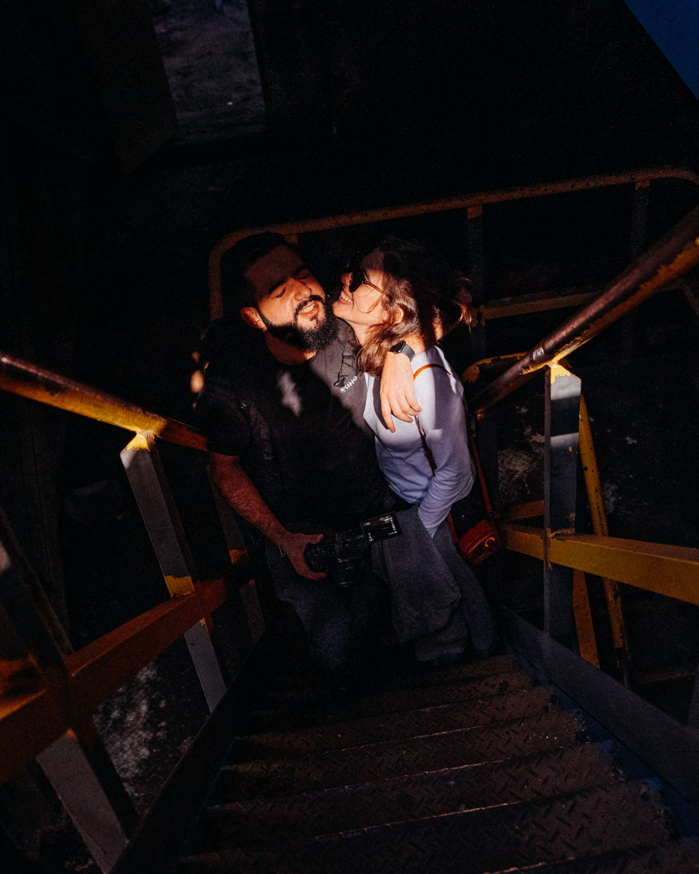 Hugging Couple on Steps · Free Stock Photo