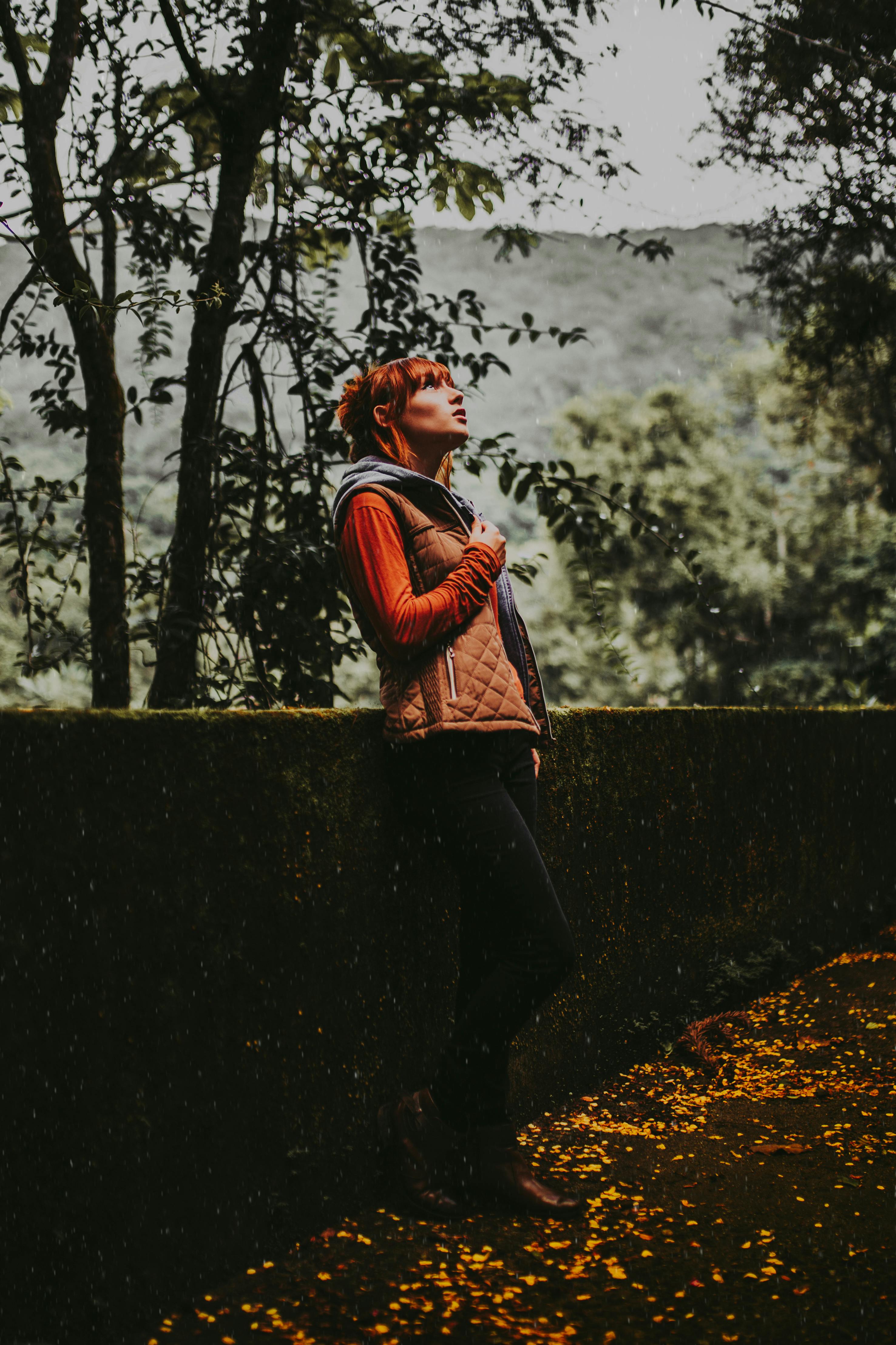 Beautiful Woman Leaning on Railing · Free Stock Photo