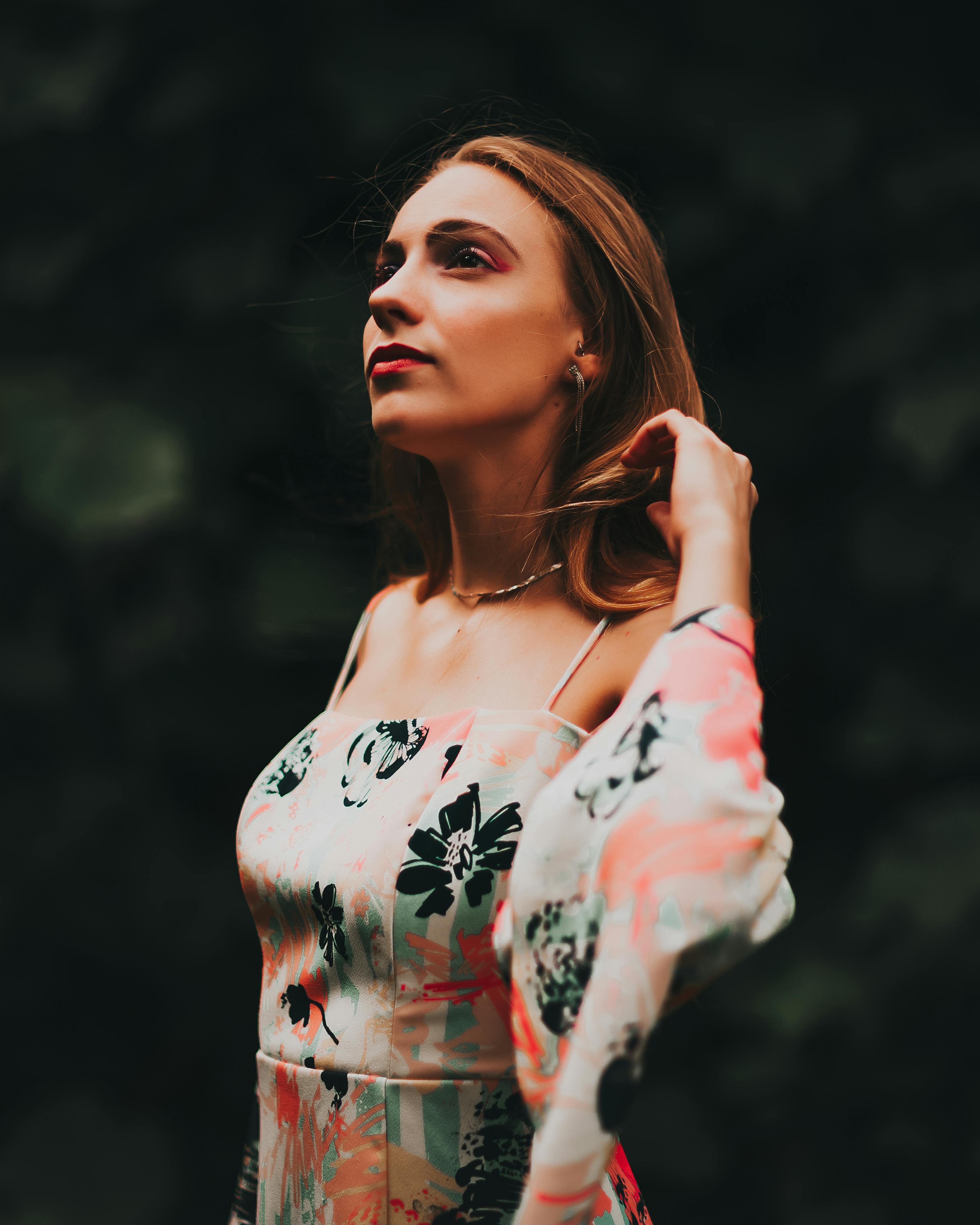 Woman Posing with Bow · Free Stock Photo