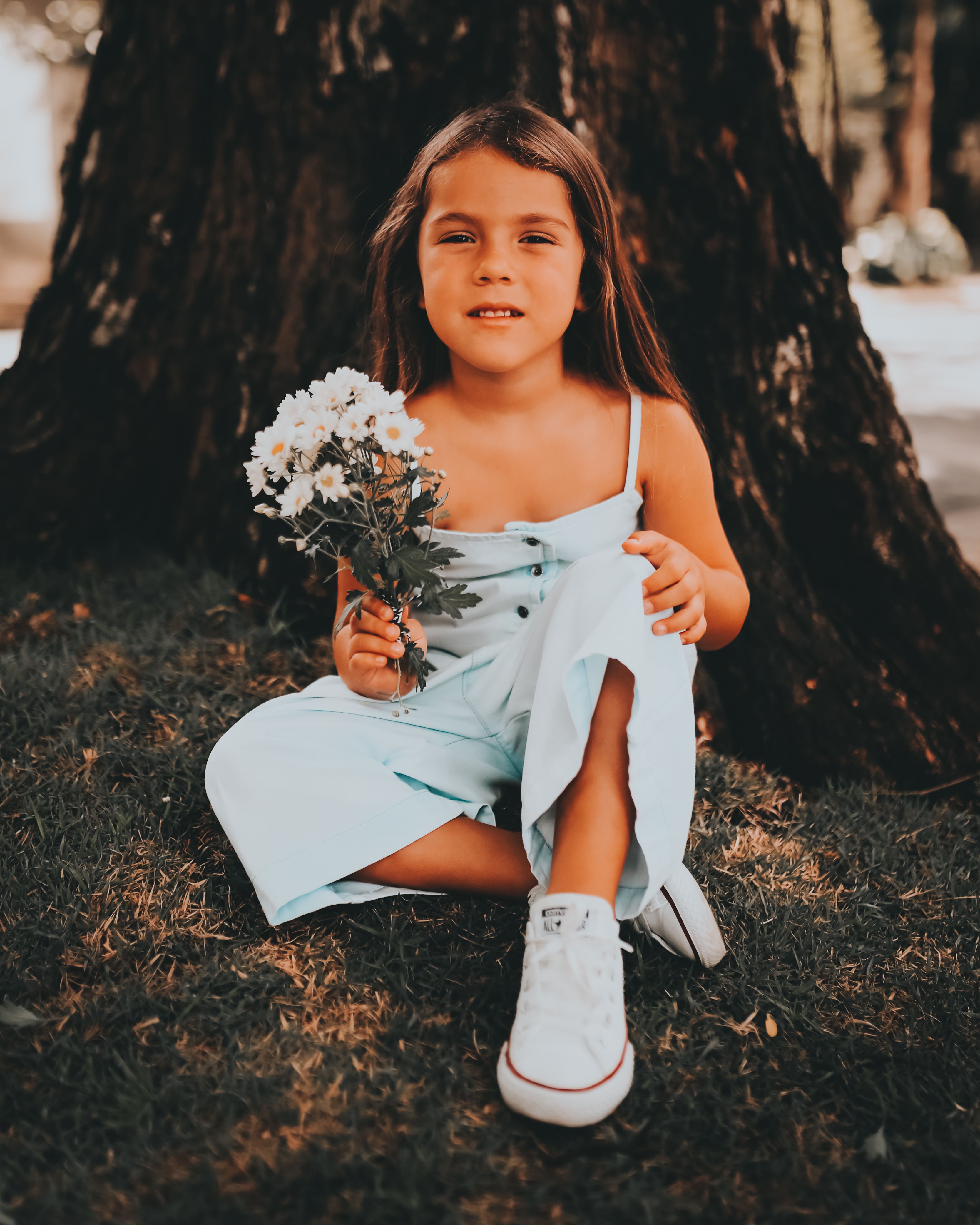 Black and White Photo of a Crouching Child · Free Stock Photo