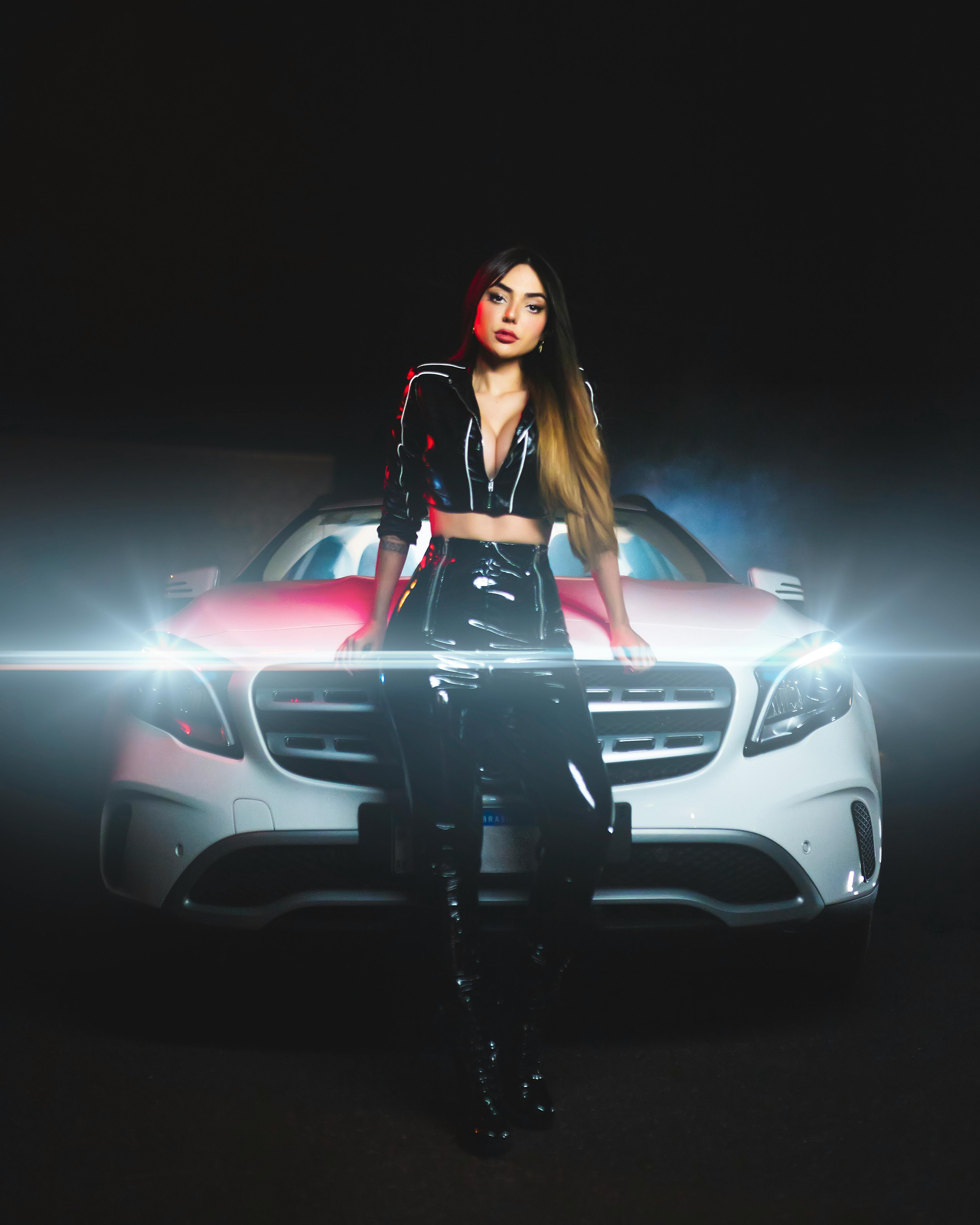 Crop faceless woman sitting gracefully in car passenger seat · Free ...