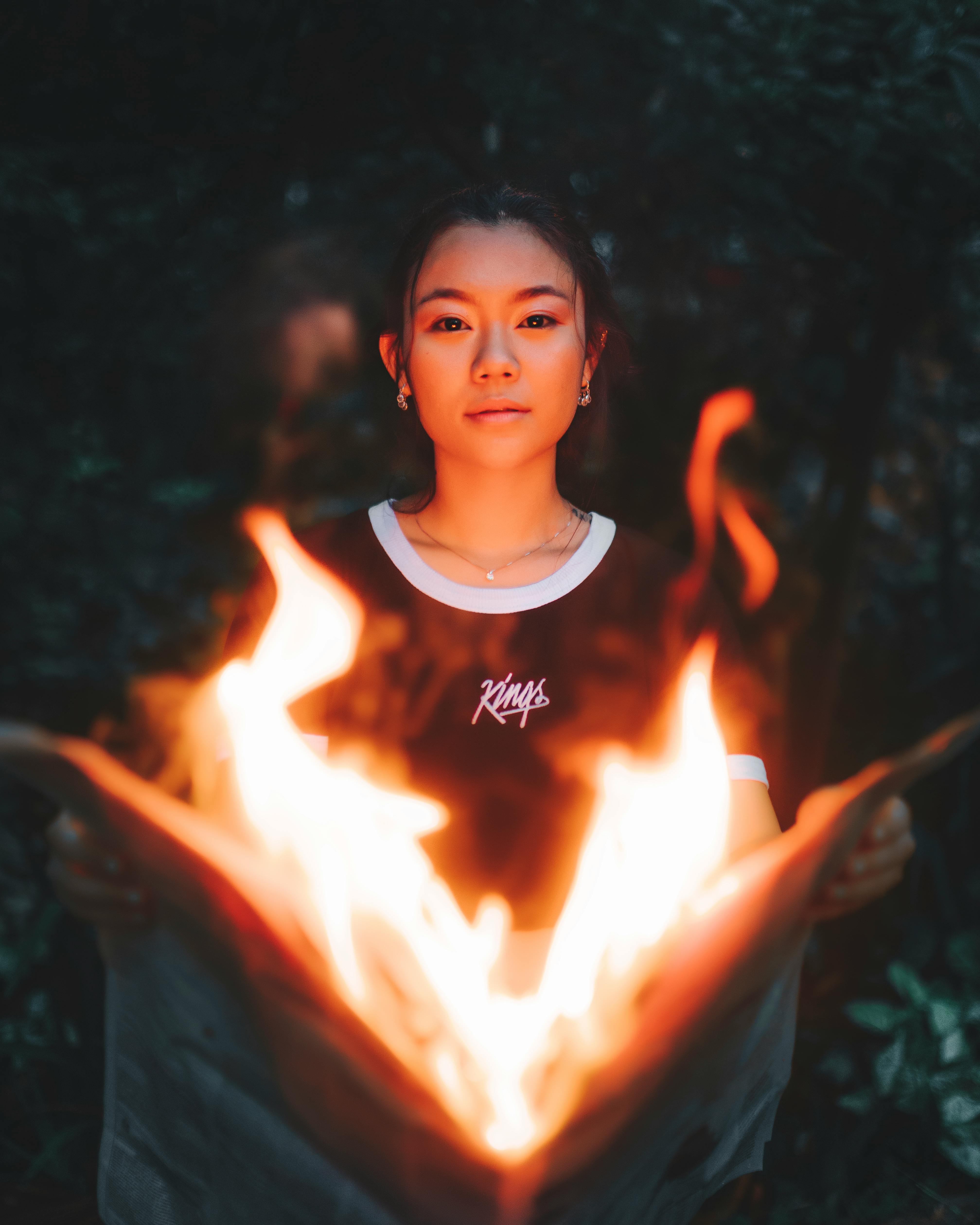 Woman Posing with Flame on Match · Free Stock Photo