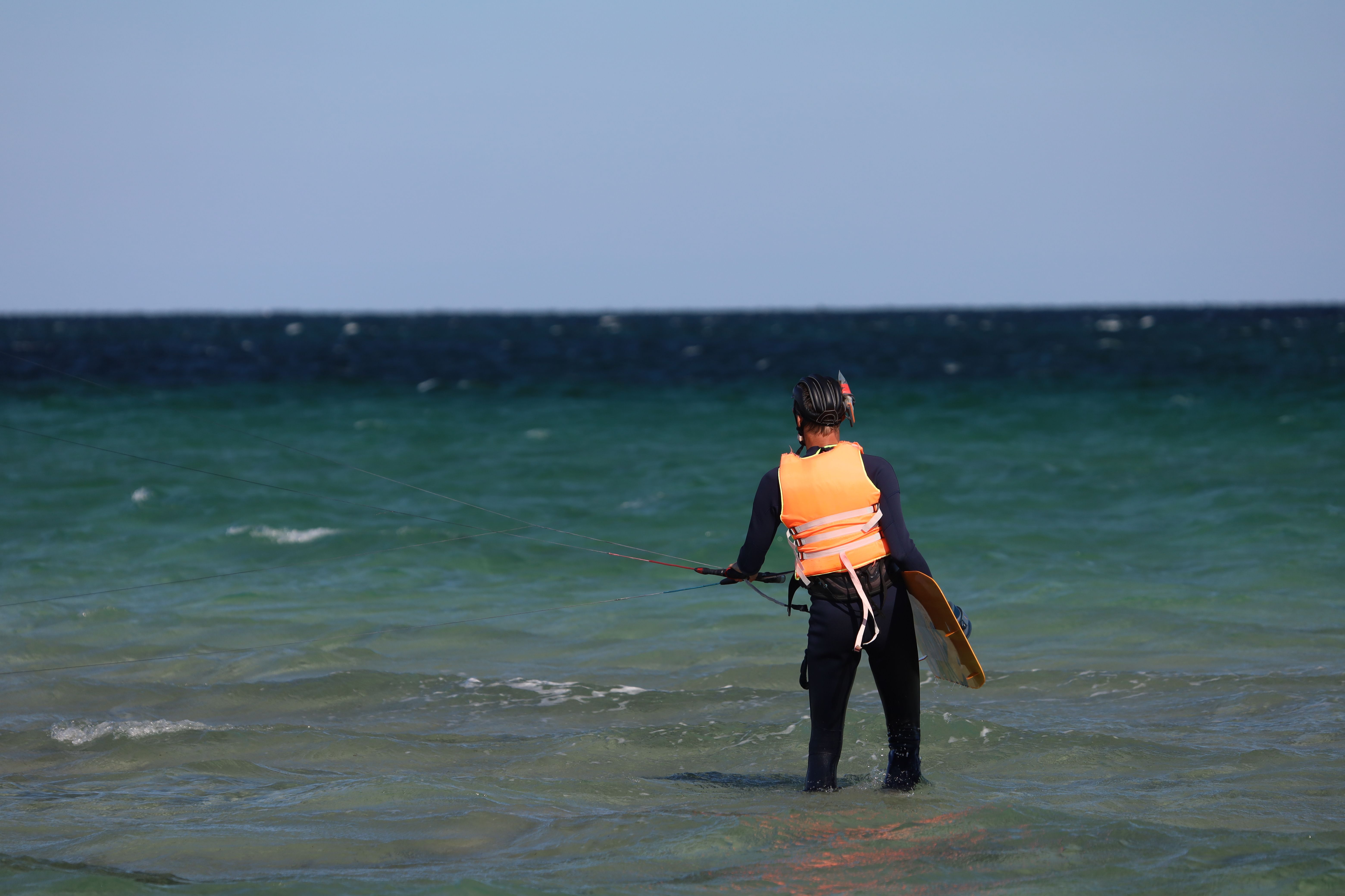 Teenagers Standing Ankle Deep in Water · Free Stock Photo