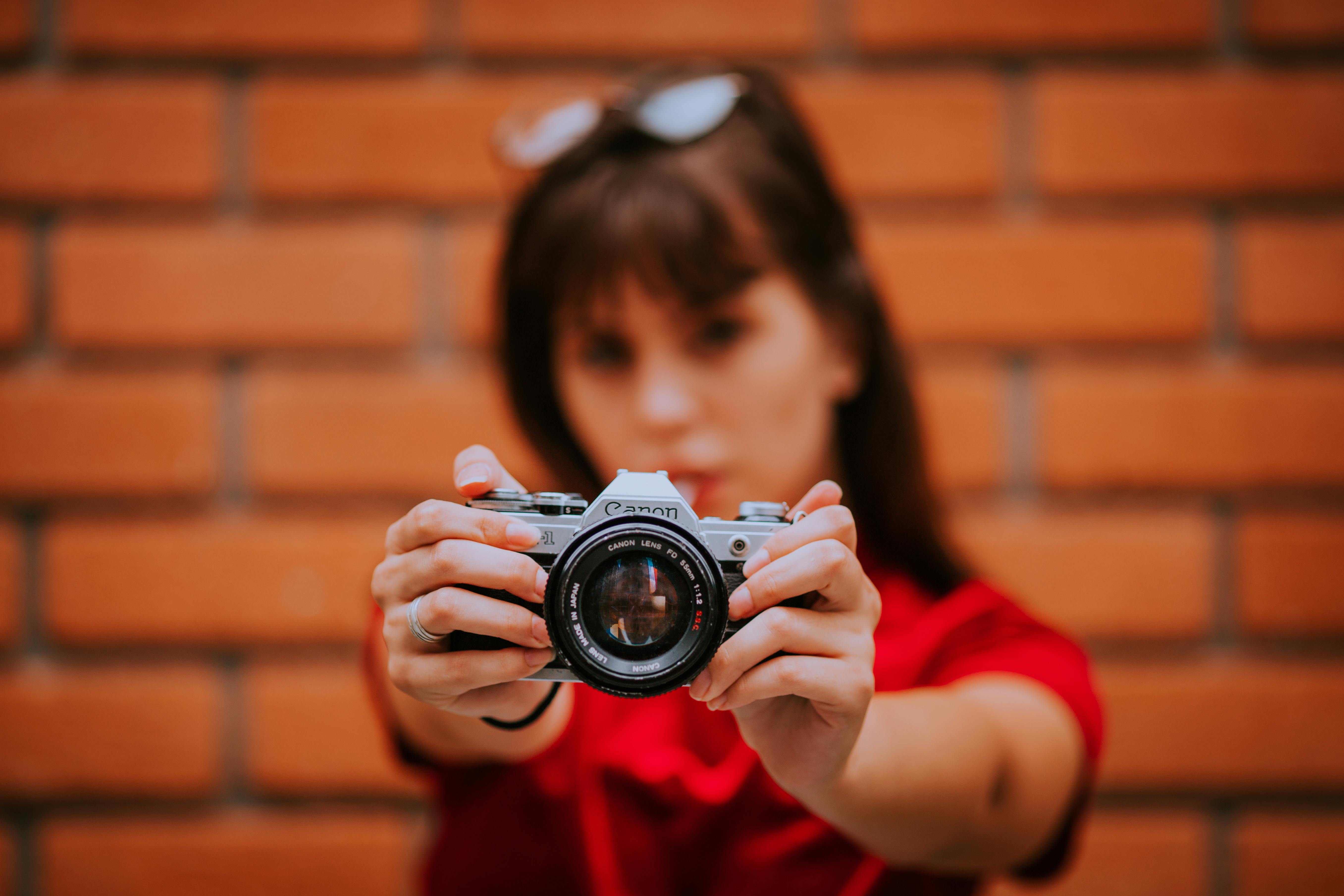A Person Holding a Camera · Free Stock Photo