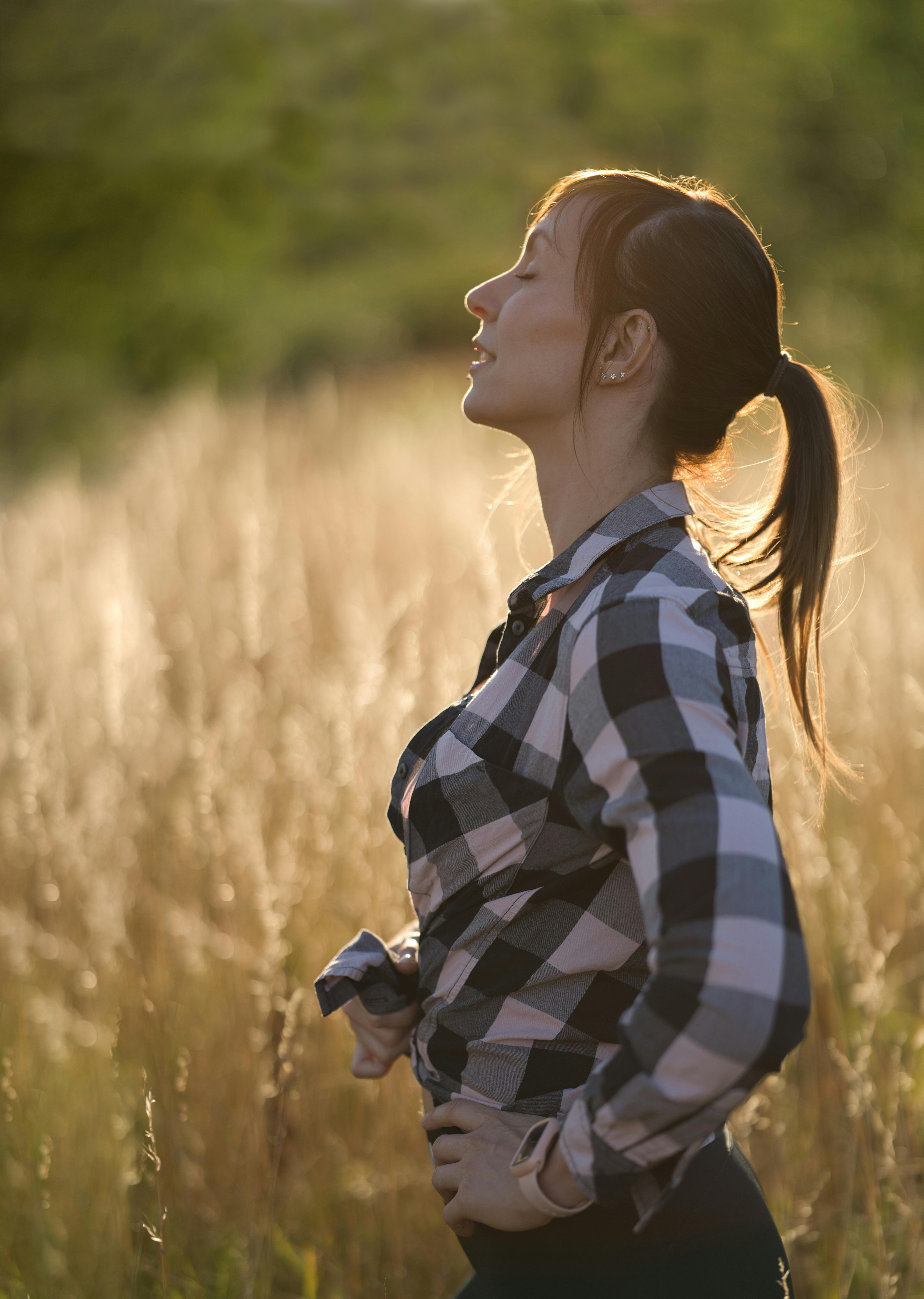 Little Girl Wearing Checked Shirt on a Meadow · Free Stock Photo