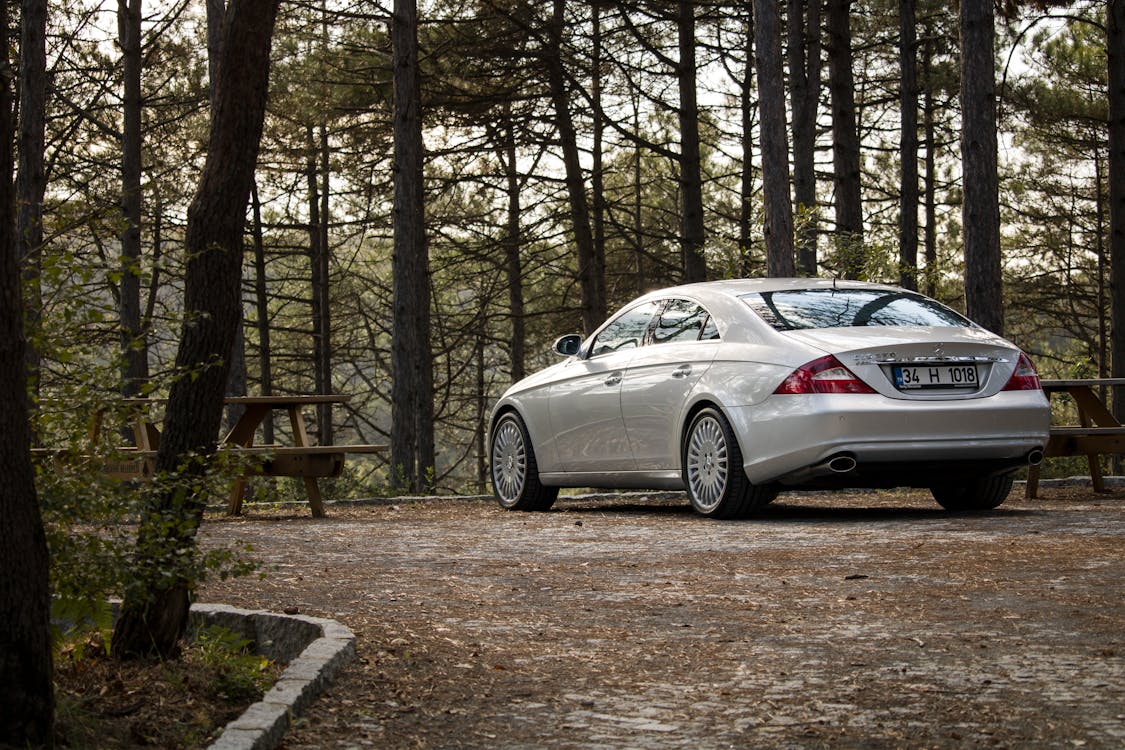 Silver Car Parked in a Park · Free Stock Photo Silver Car Parked in a Park · Free Stock Photo