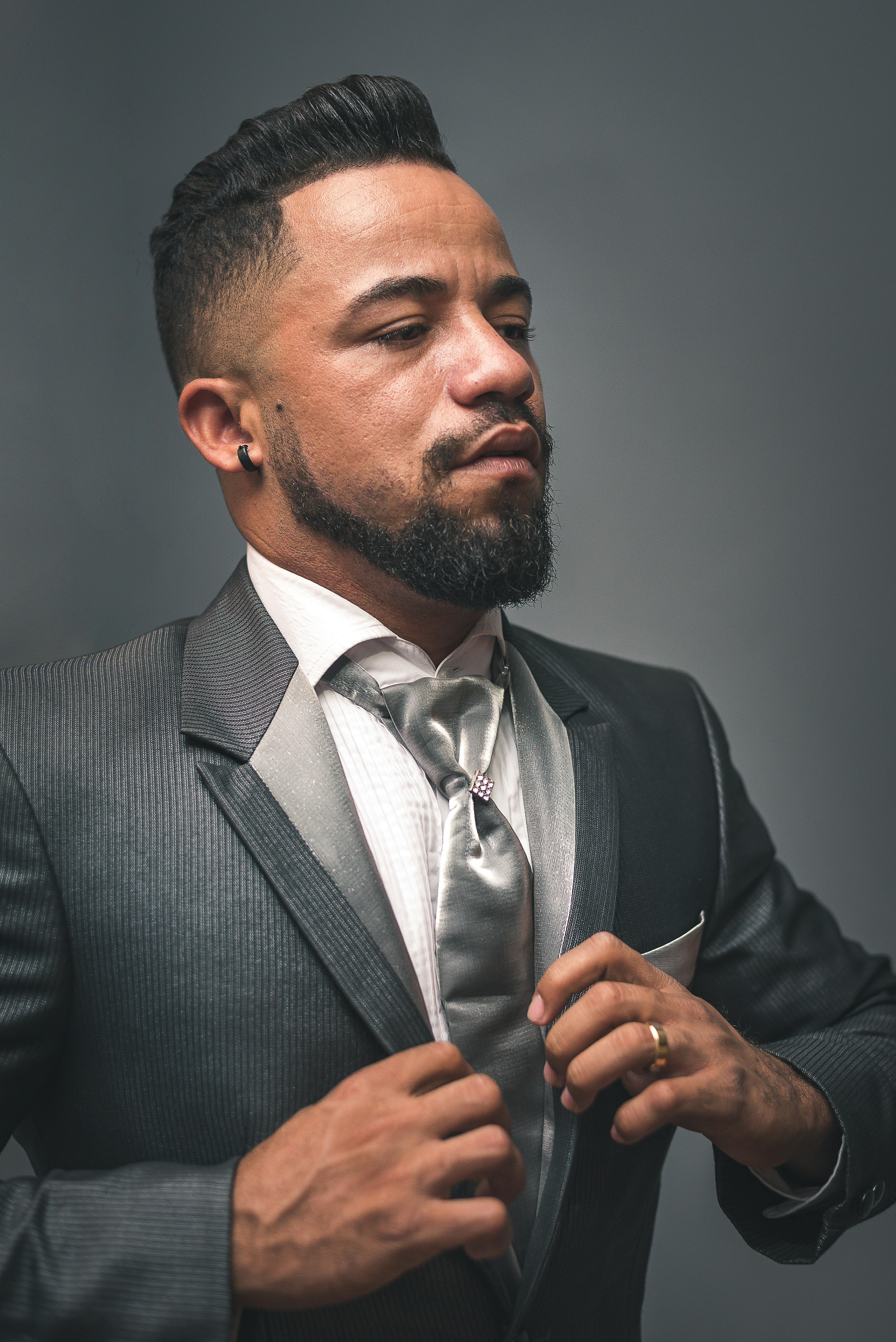 A Man in Gray Suit with Gray Necktie · Free Stock Photo