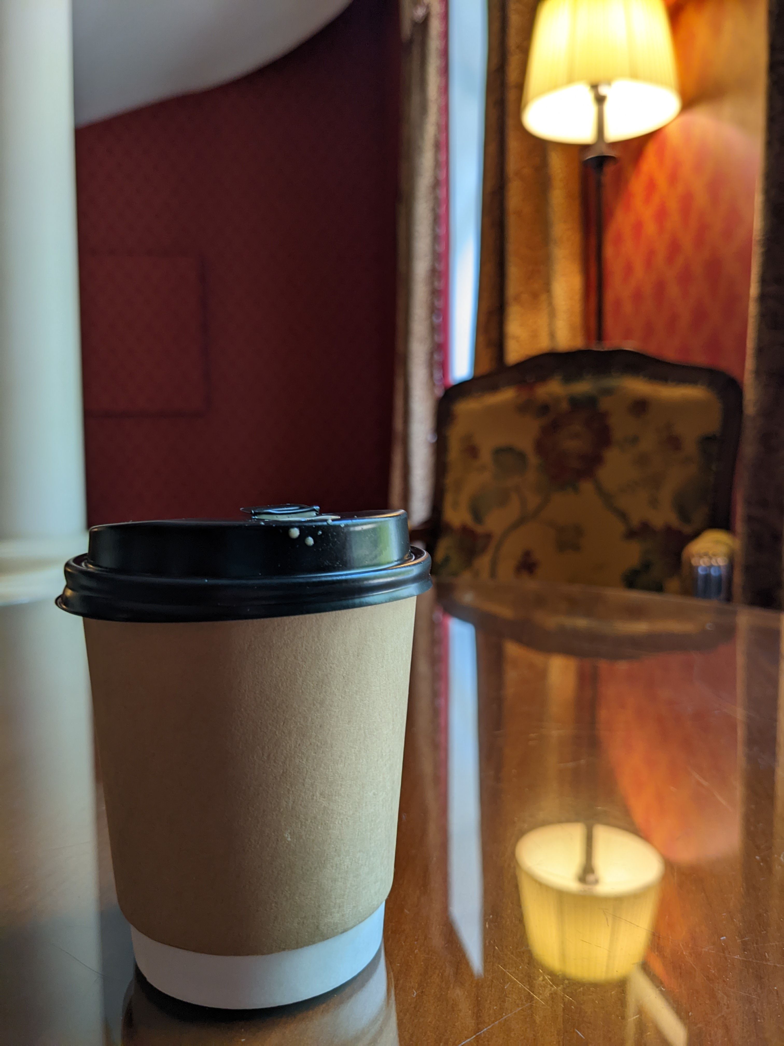A Paper Cup with a Straw on the Wooden Table · Free Stock Photo