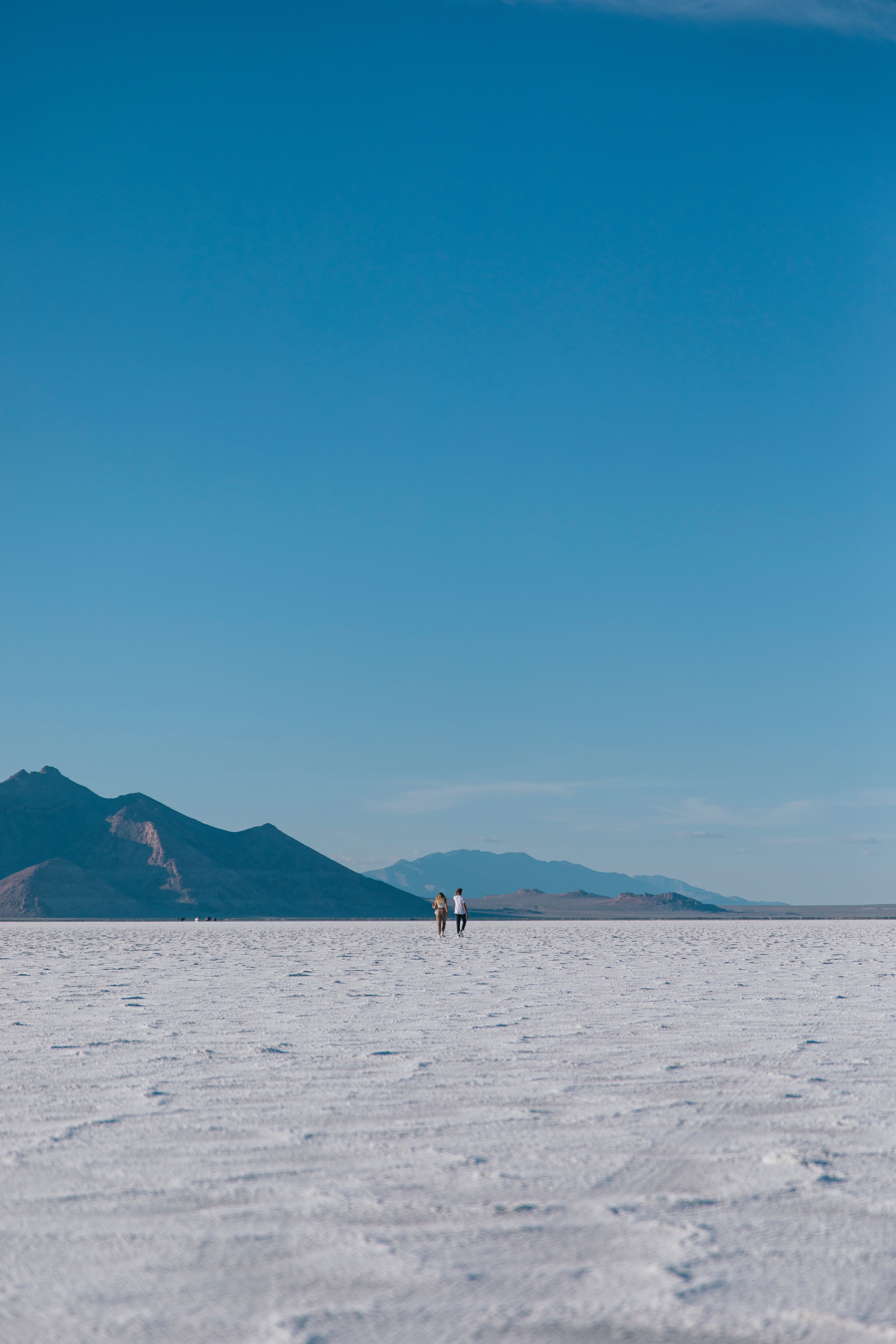 People Walking on Ice in Mountains Landscape · Free Stock Photo