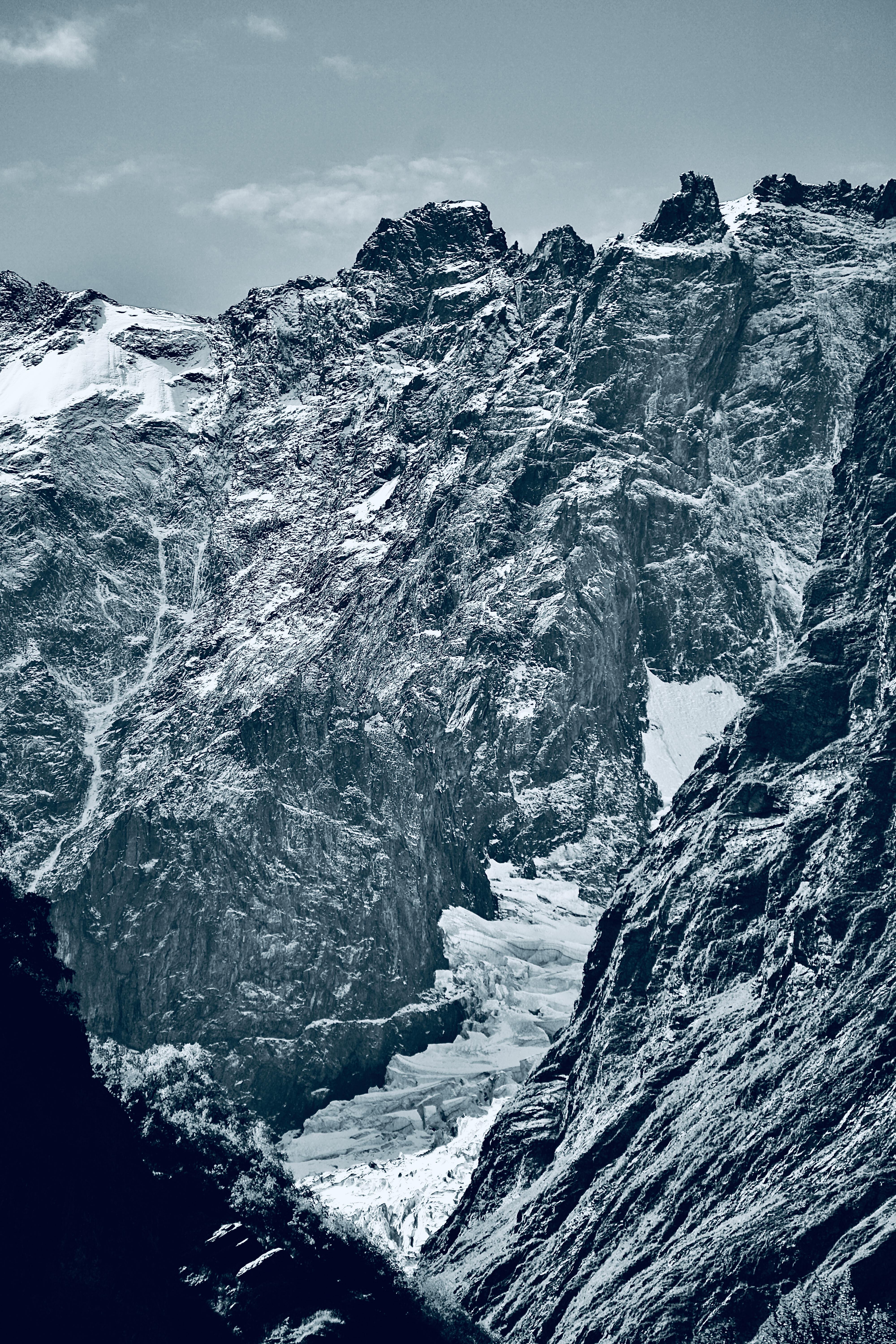 Snow Covered Rugged Mountain With Mist Photograph · Free Stock Photo