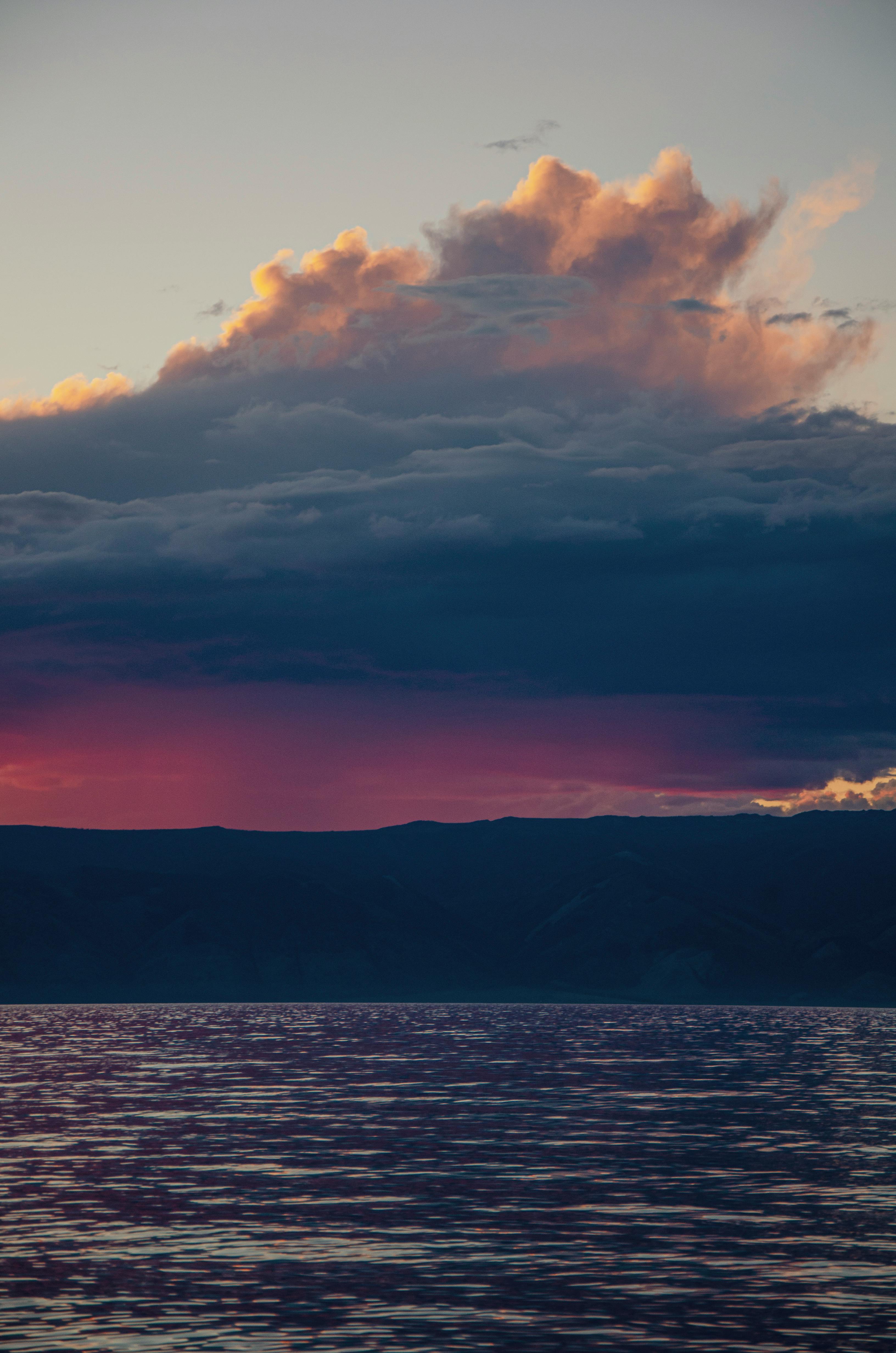 Ocean Under Cloudy Sky · Free Stock Photo