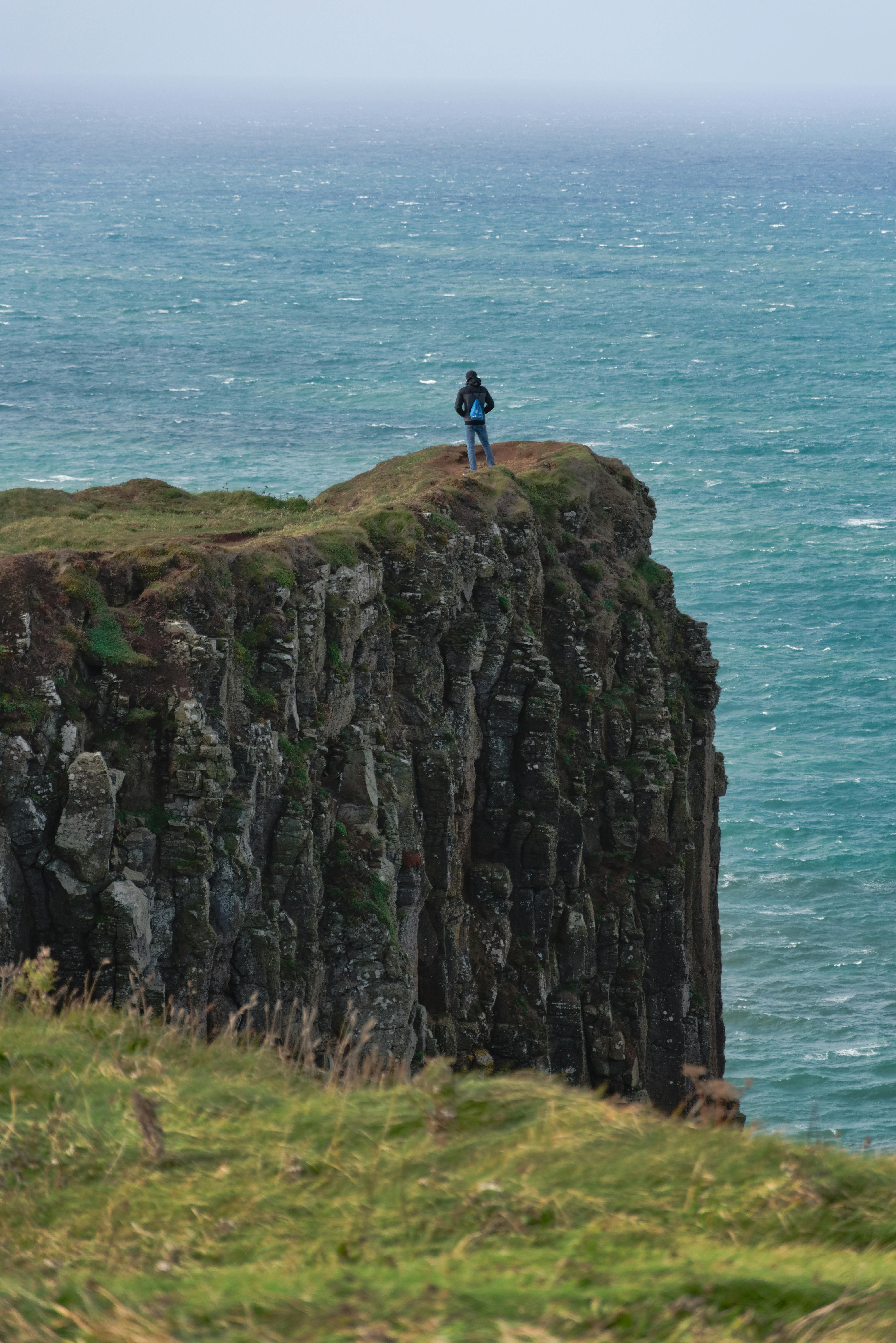 A Person Standing on the Cliff · Free Stock Photo