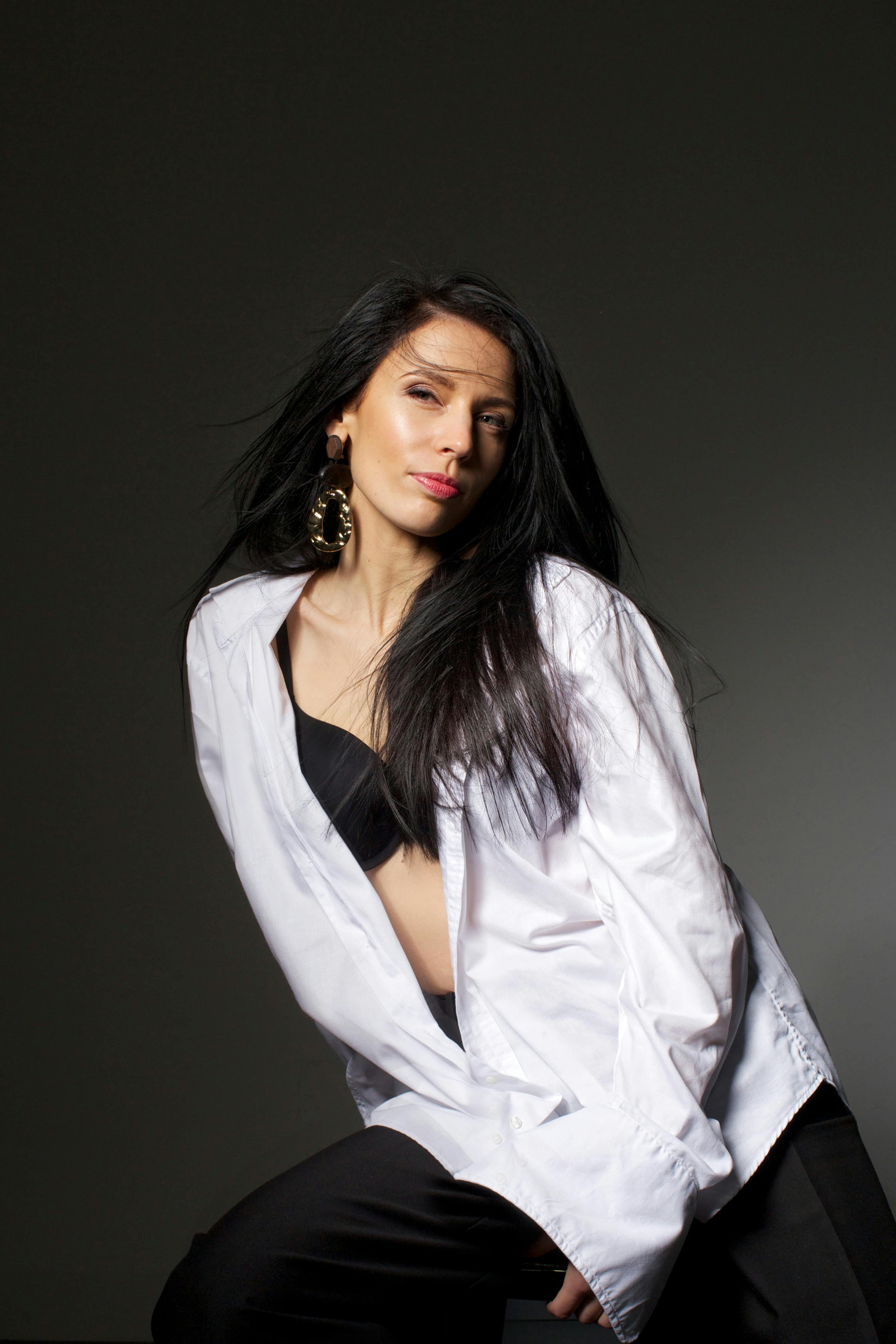 Woman in a Dynamic Pose · Free Stock Photo