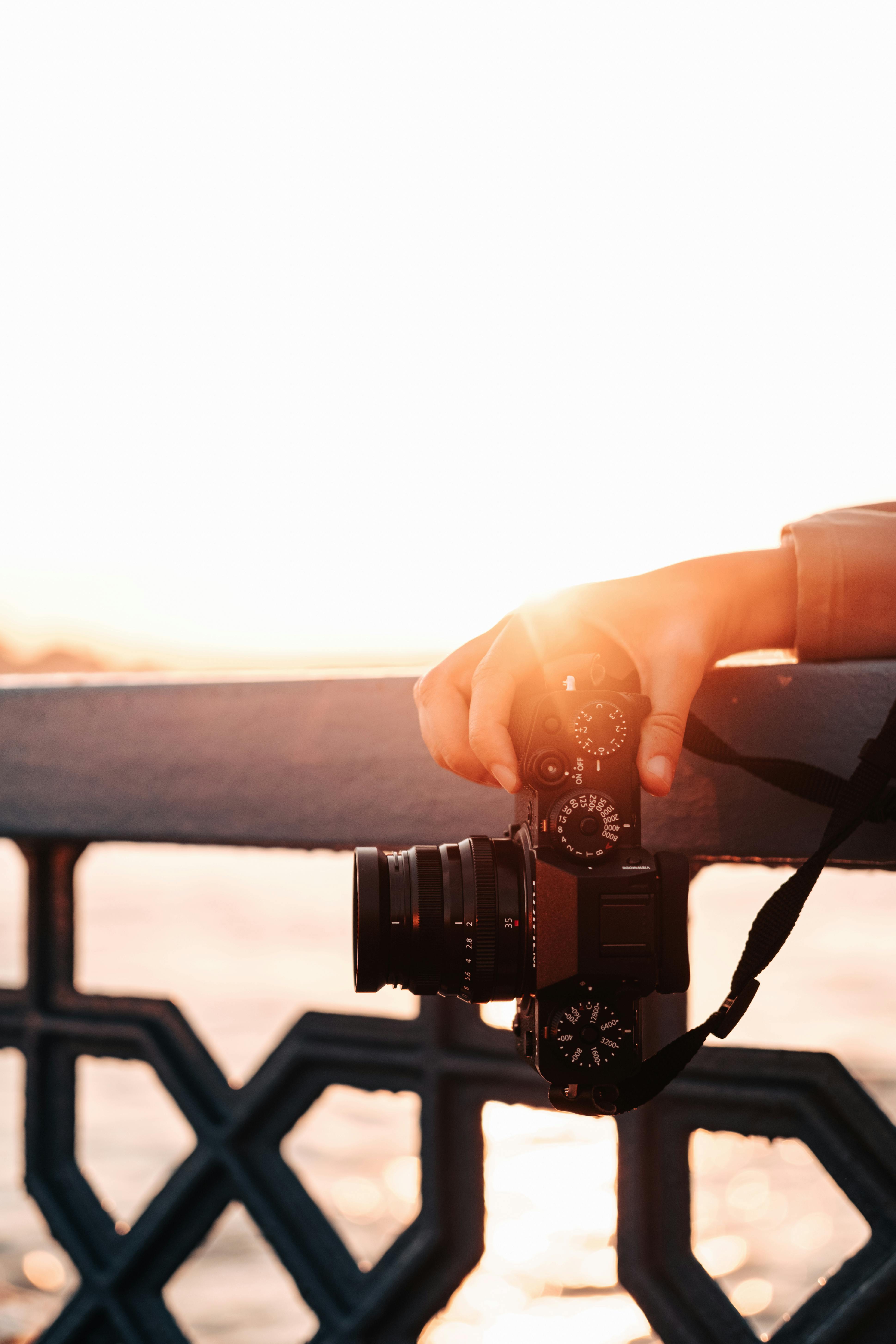 A Person Holding a Camera · Free Stock Photo