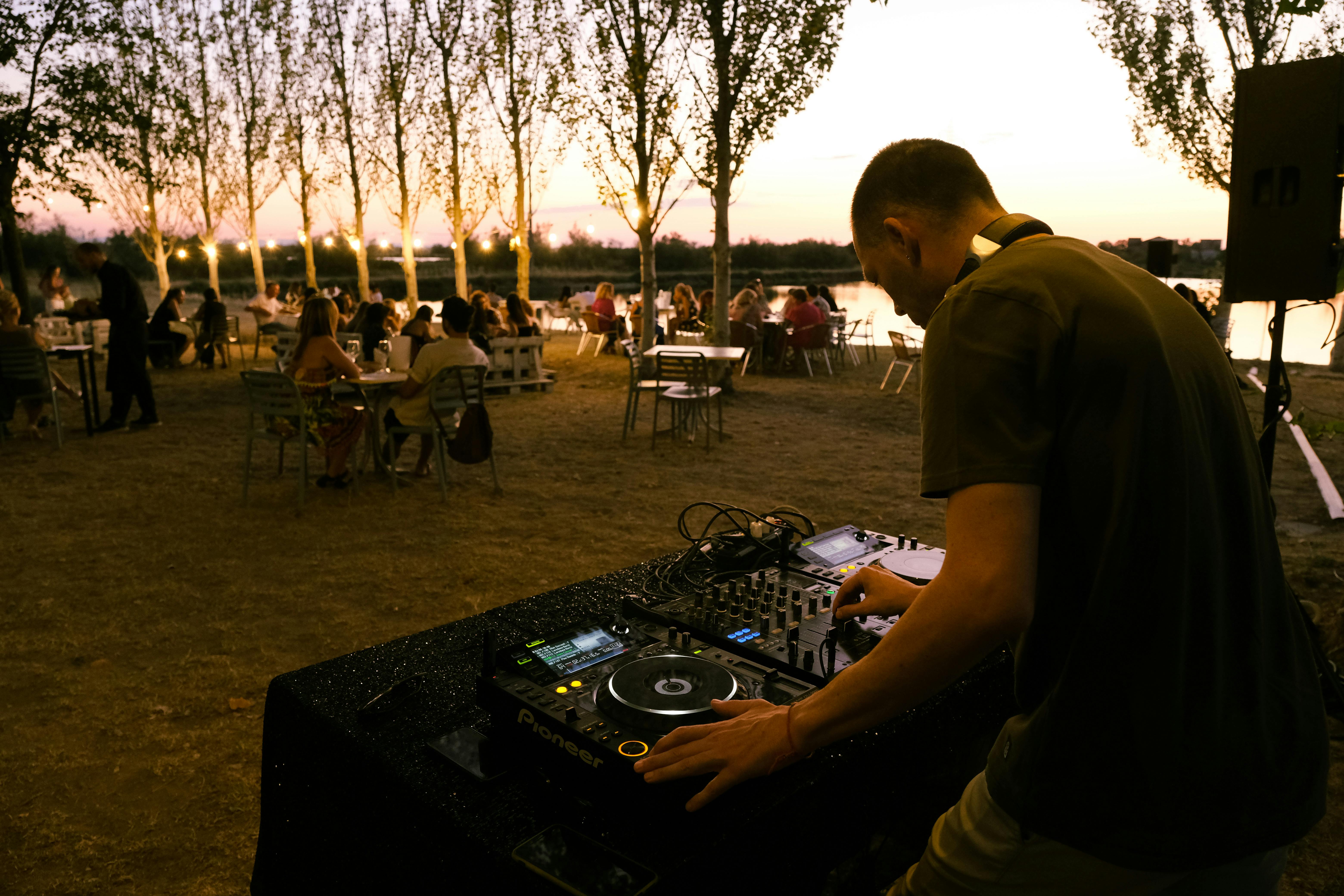A DJ at an Outdoor Party · Free Stock Photo