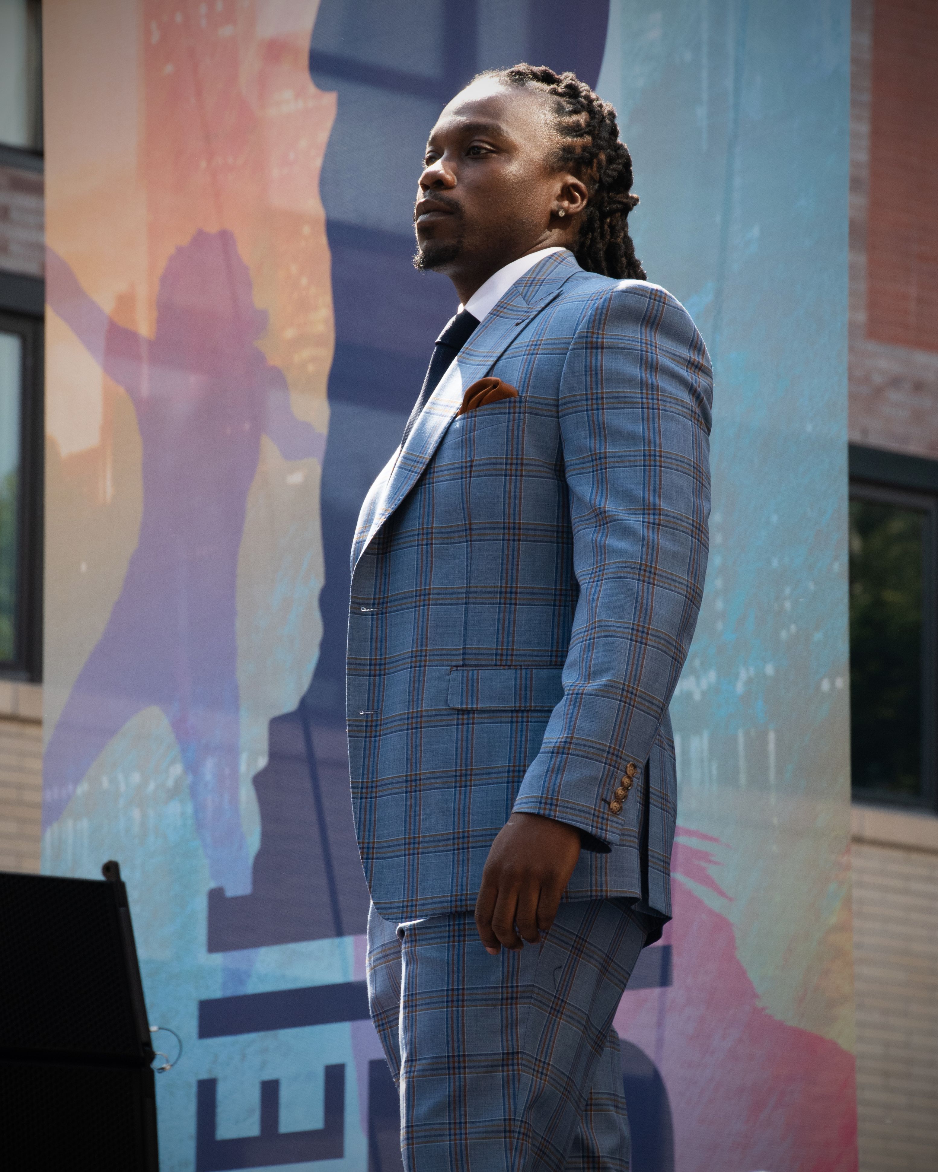 Low-Angle Shot of a Man Wearing Plaid Suit · Free Stock Photo