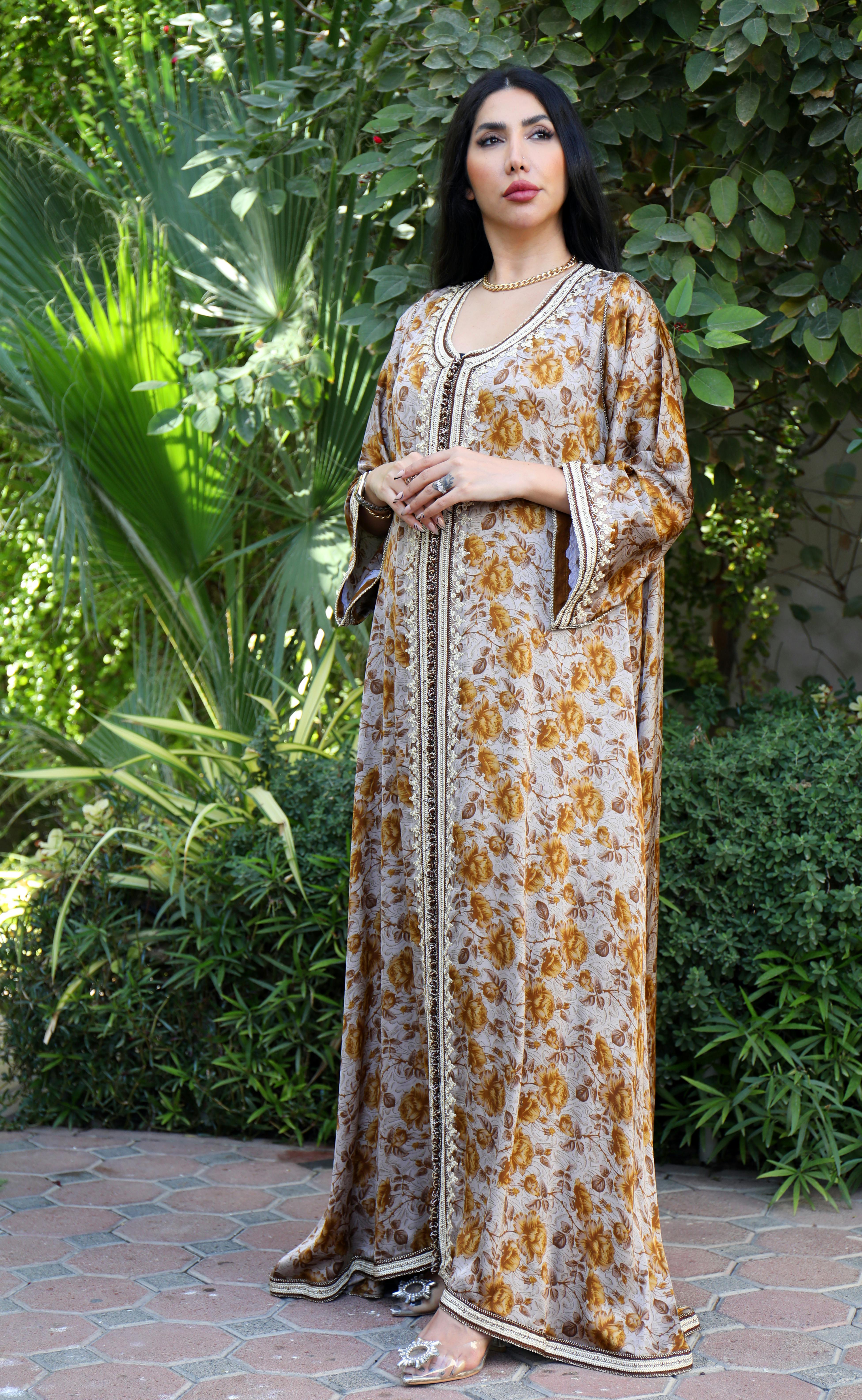 Woman Wearing a Floral Abaya · Free Stock Photo