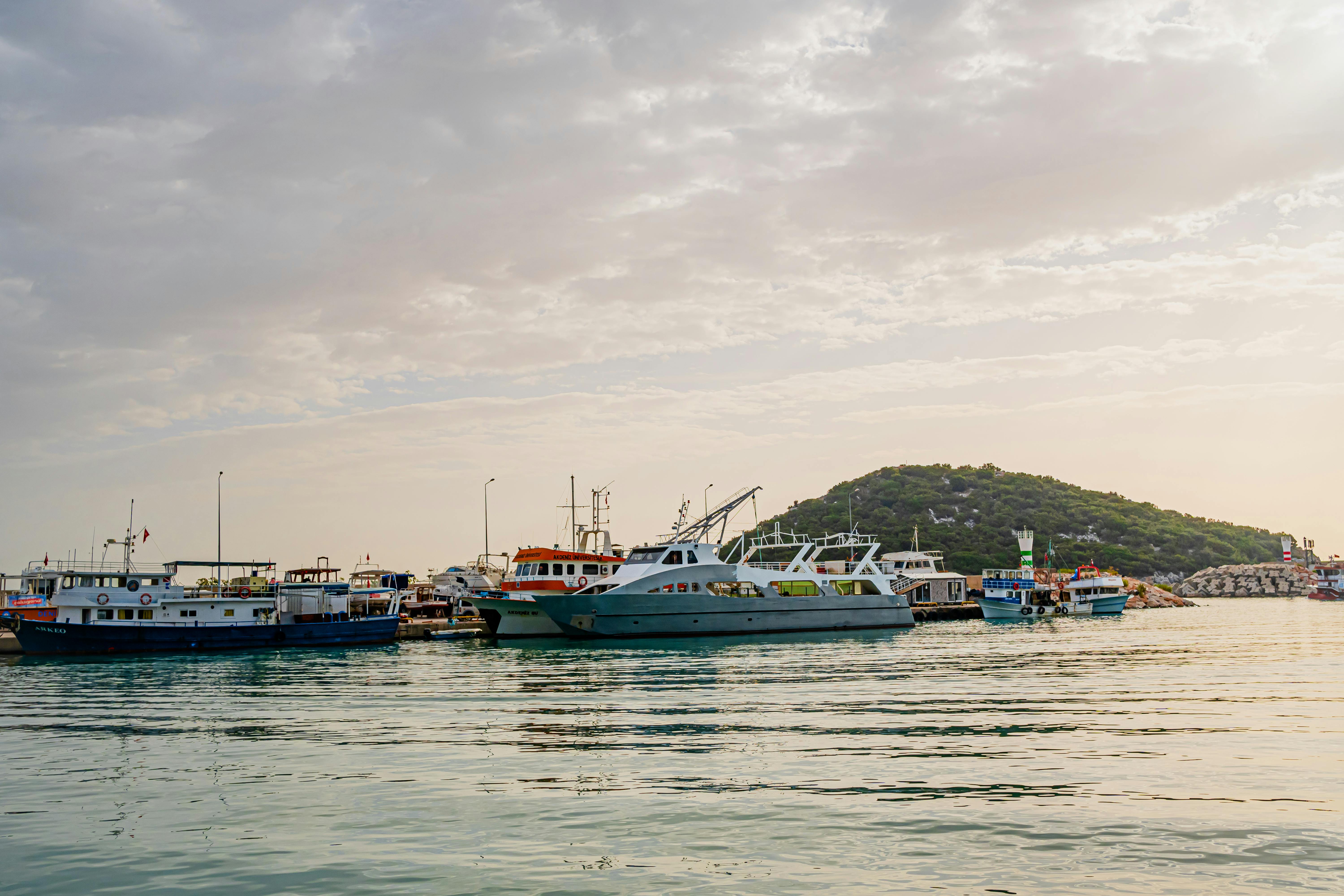 Boats and Yacht on the Harbor · Free Stock Photo