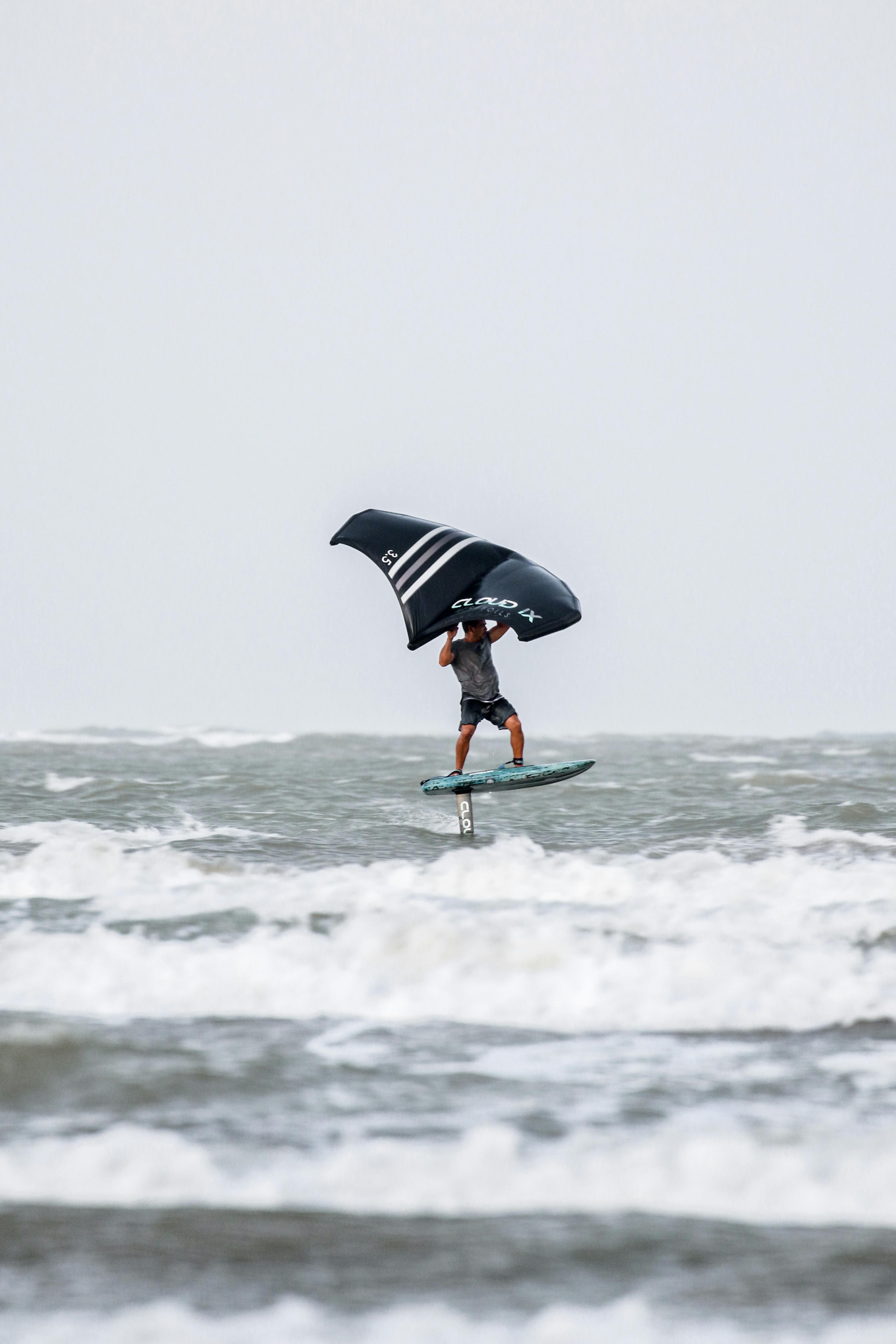 A Man Wing Foiling · Free Stock Photo