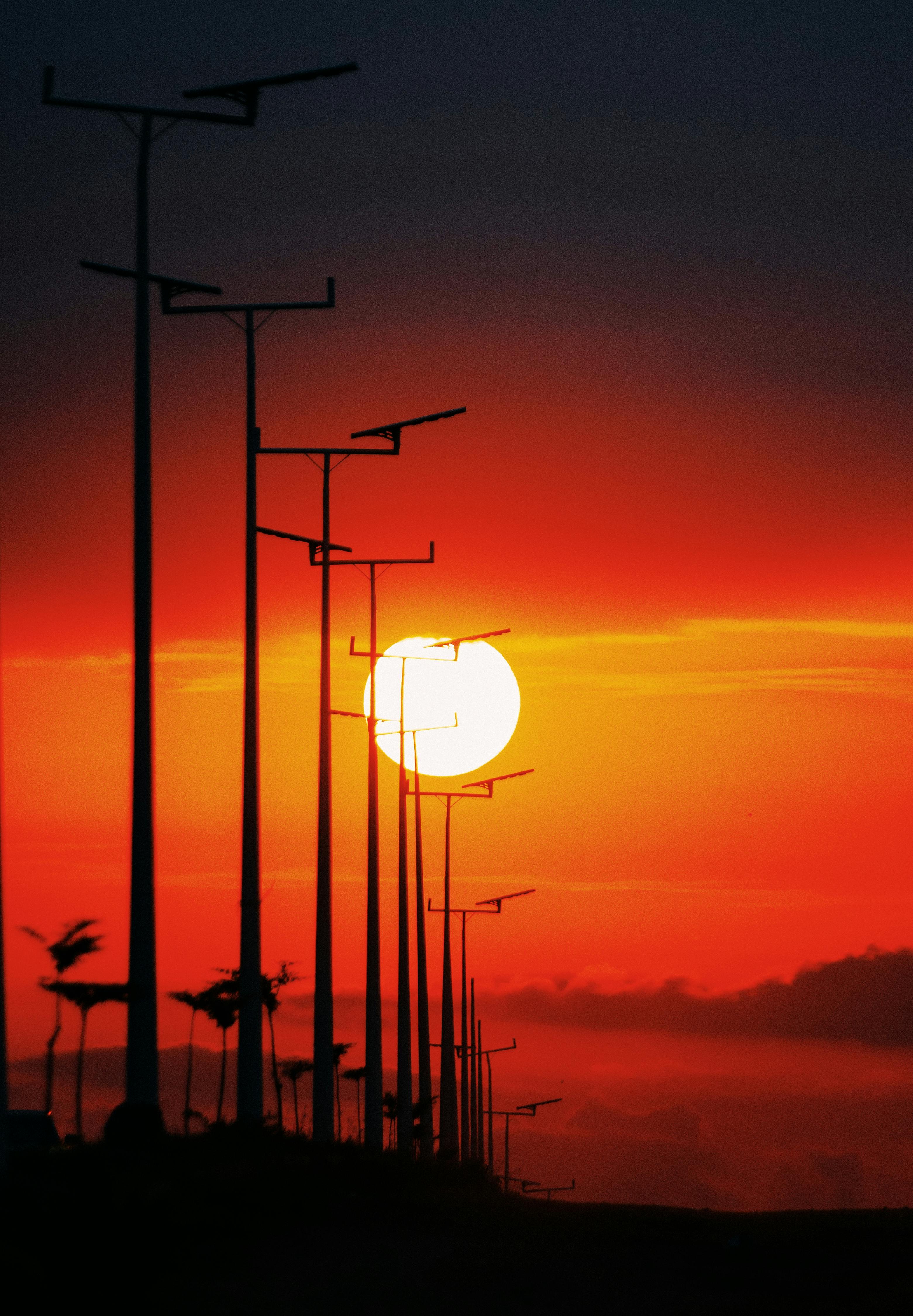 Silhouette of Street Lights during Sunset · Free Stock Photo