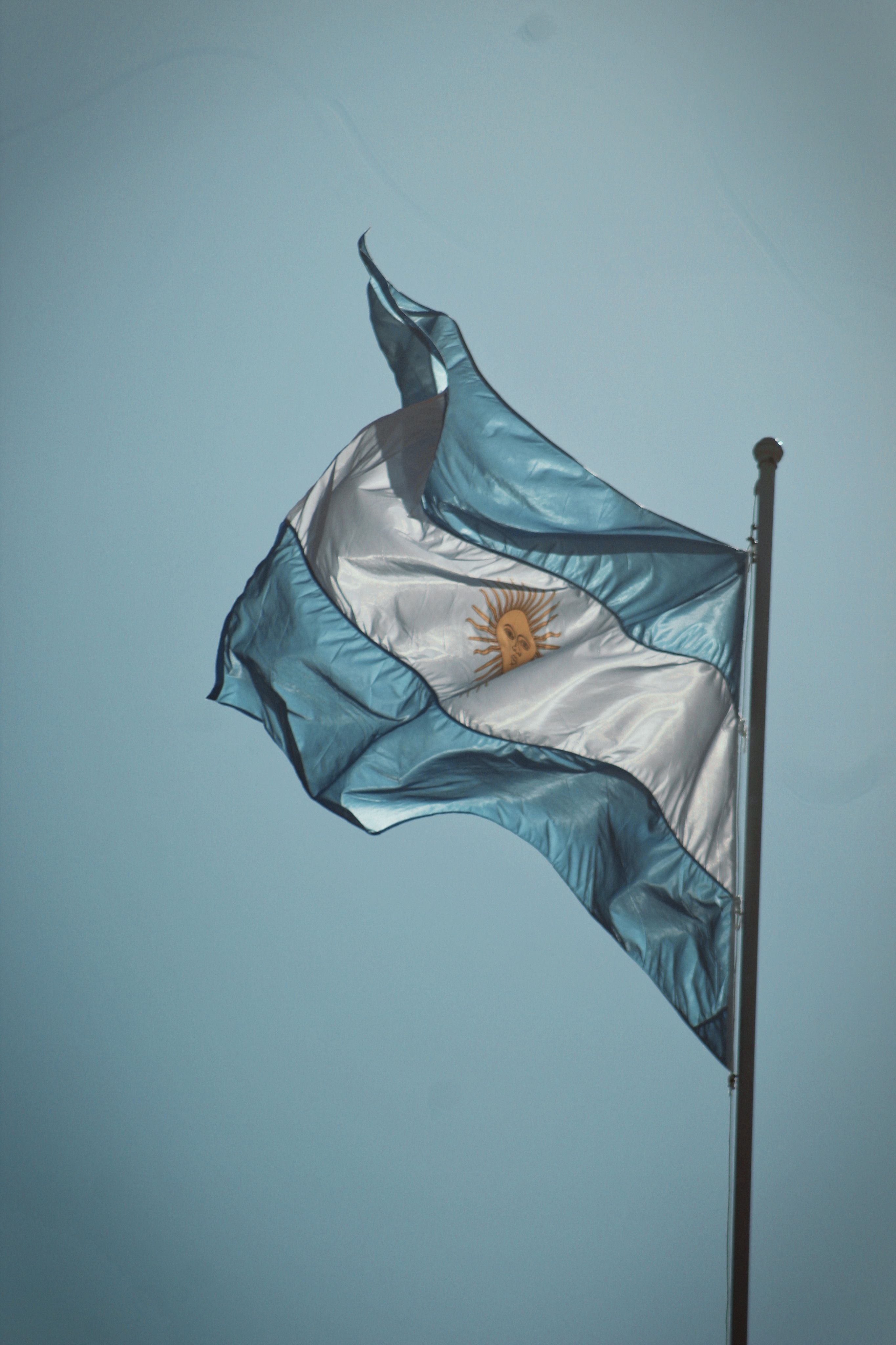 Flag of Ethopia Under Blue Sky · Free Stock Photo