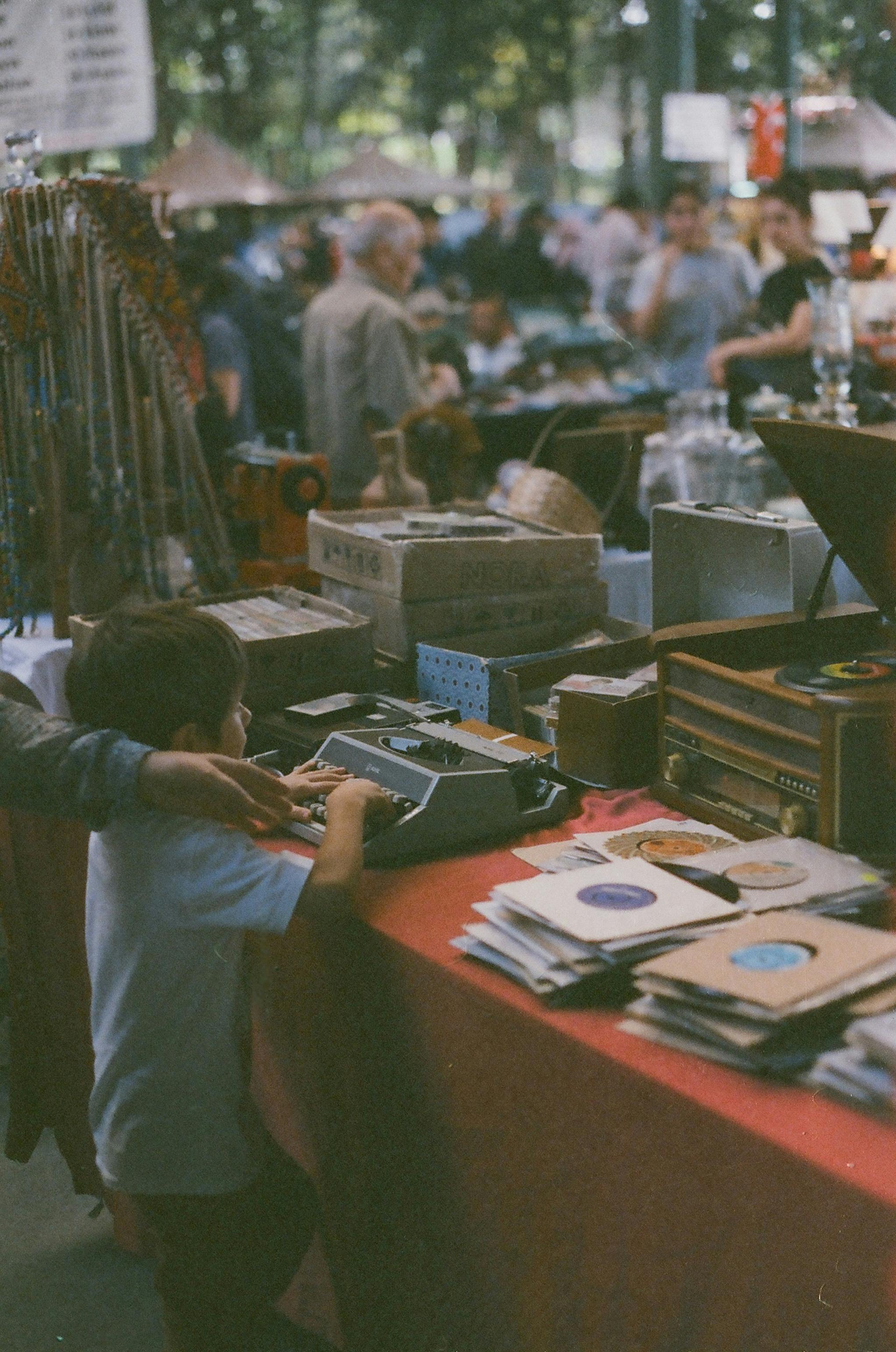 Boy with a Fruit Market Stall · Free Stock Photo