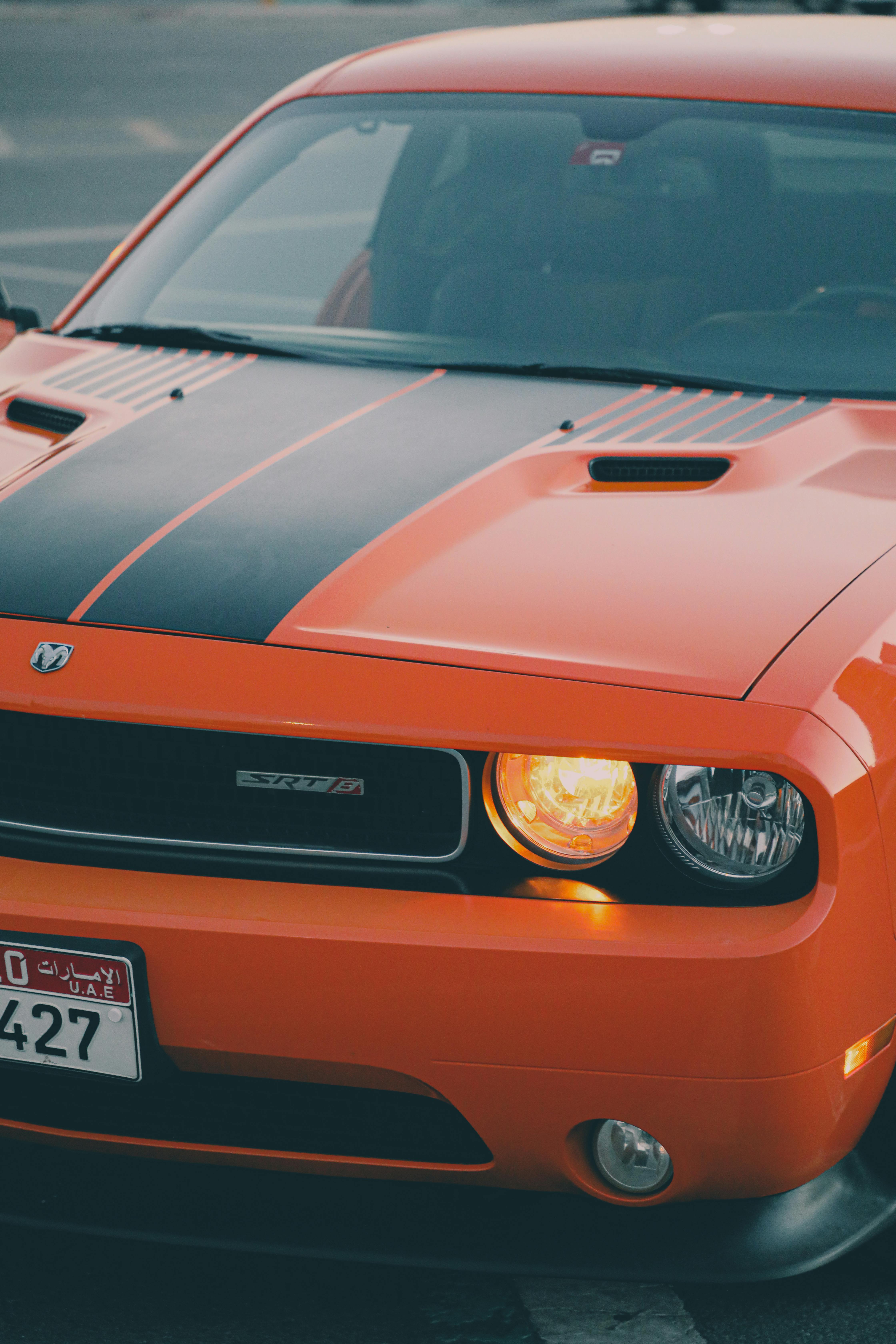 An Orange Expensive Car in Close-up Photography · Free Stock Photo